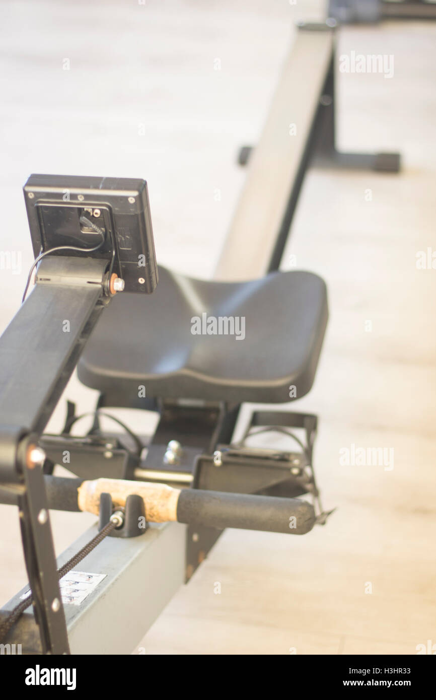 Gym exercise rowing machine static rower in gymnasium fitness studio ...