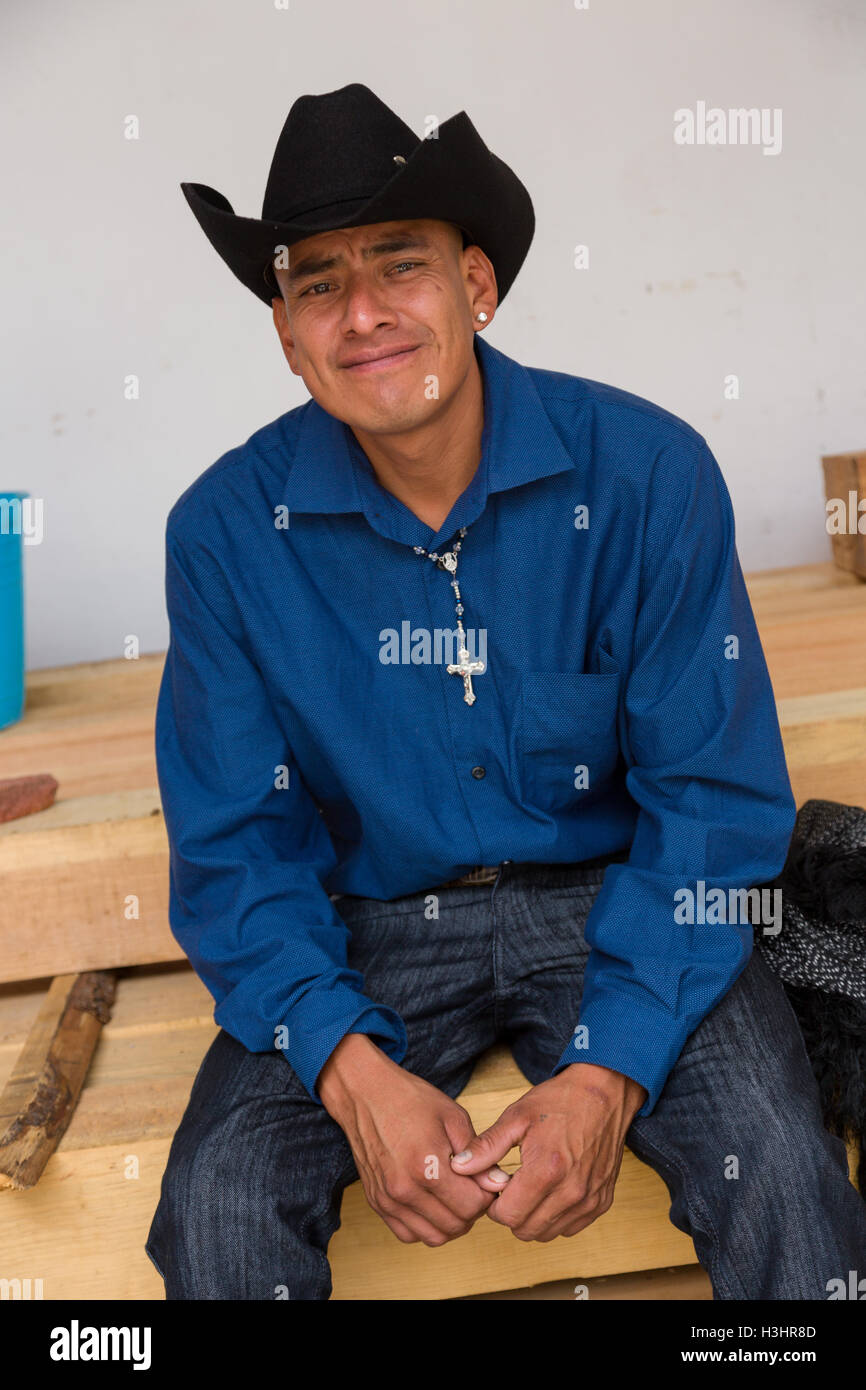 A young rancher in cowboy hat at the Sunday market in Tlacolula de ...