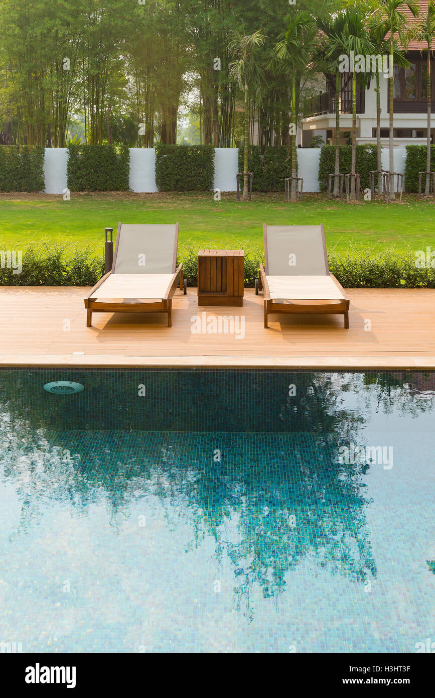 Pool bed beside the tropical resort swimming pool Stock Photo - Alamy