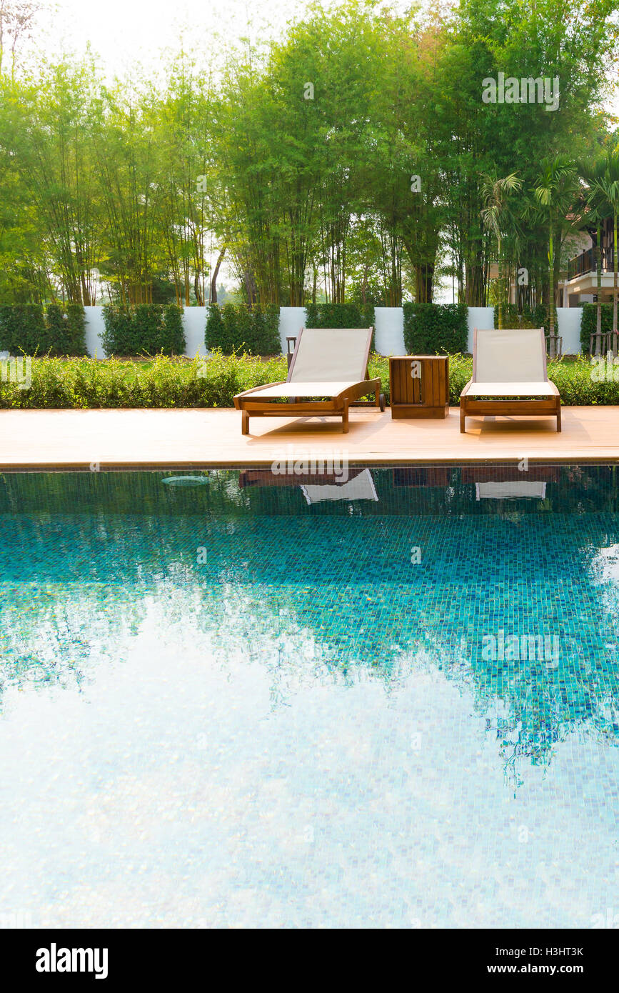 Pool bed beside the tropical resort swimming pool Stock Photo - Alamy
