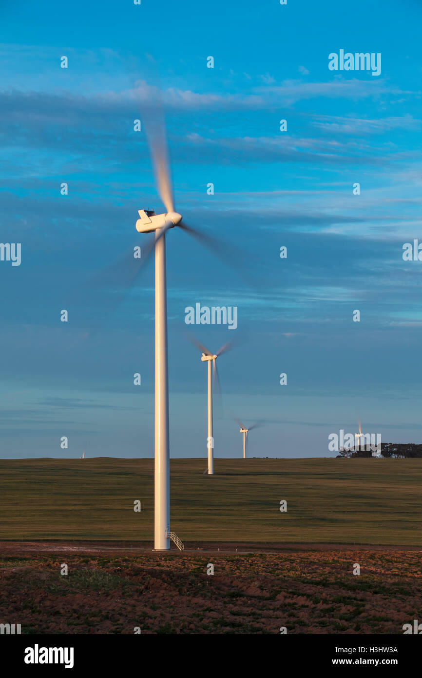 Wind Turbines generating electricity on farm land Stock Photo - Alamy