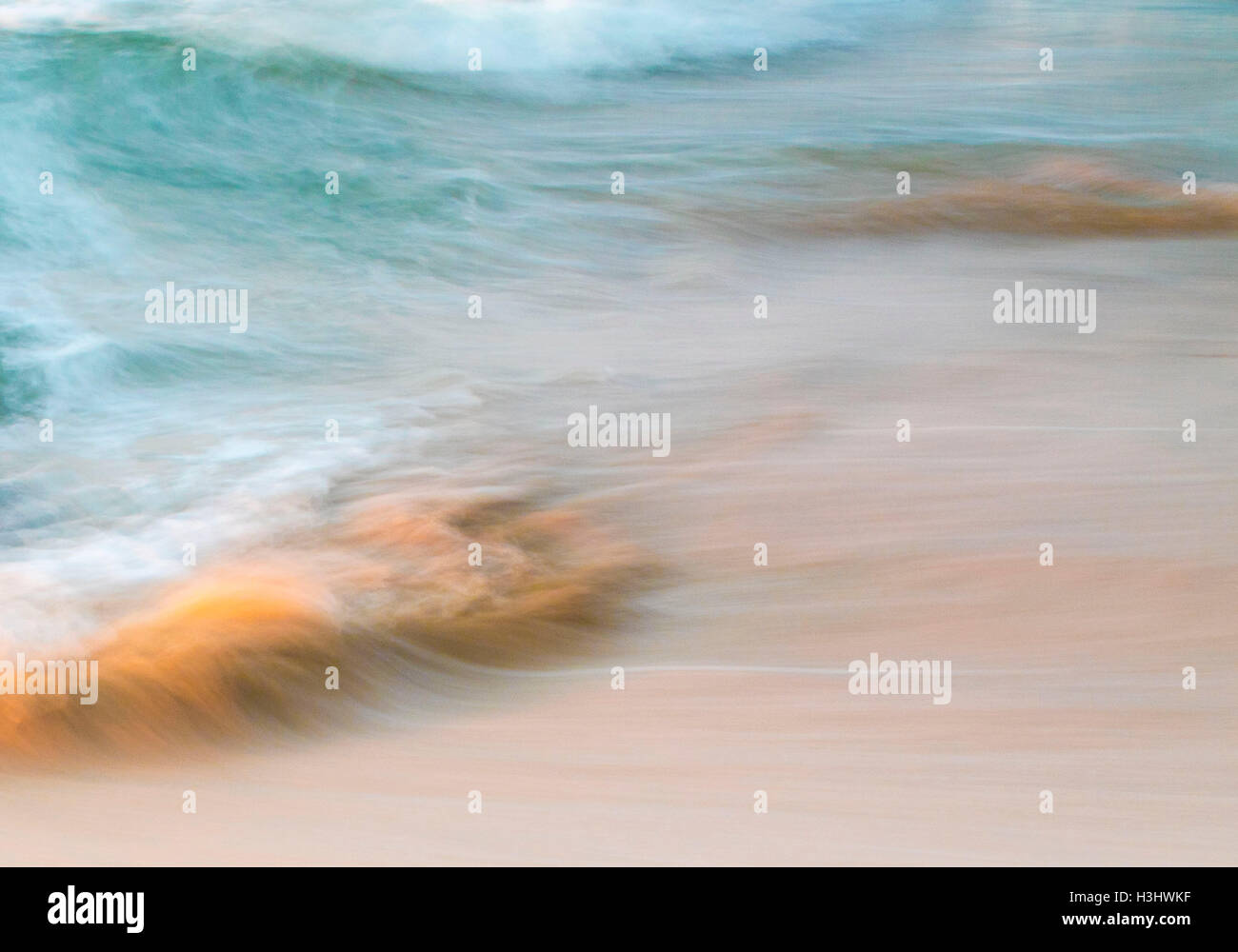 Abstract photo of a retracting wave on a beach with motion blur Stock ...