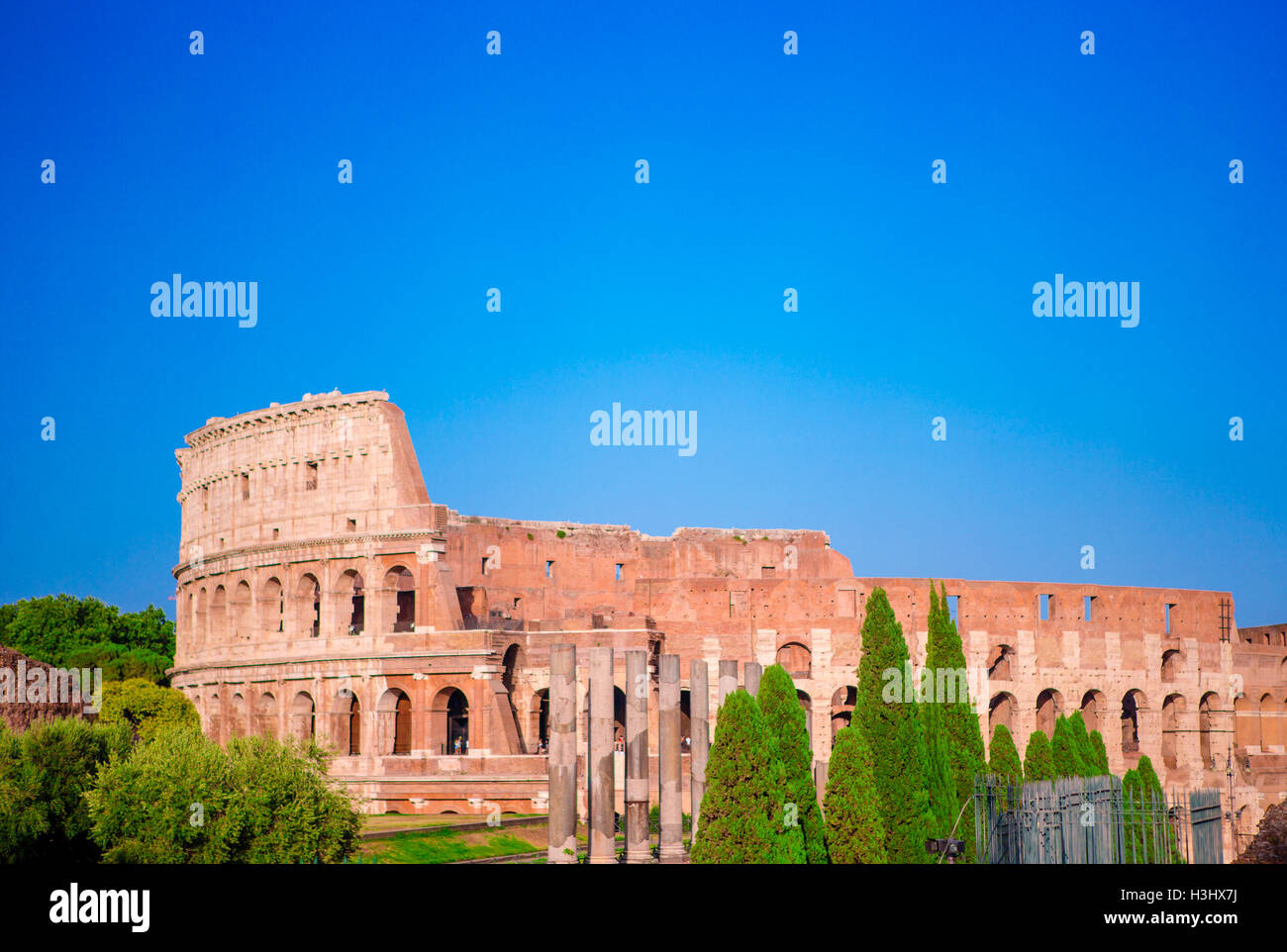 Colosseum or Coliseum background blue sky in Rome, Italy Stock Photo ...
