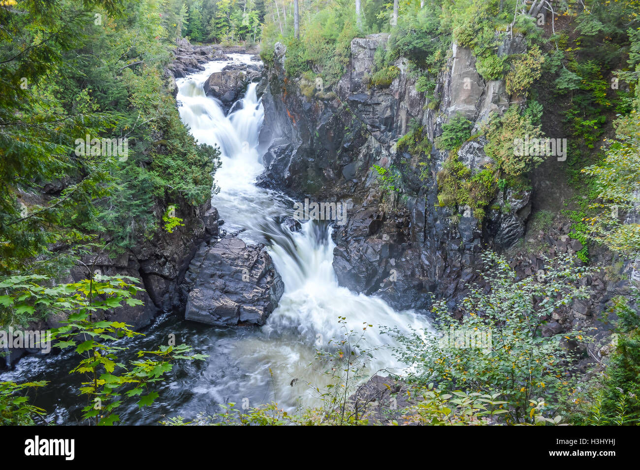 Beautiful waterfall in the forest, Quebec, Canada Stock Photo - Alamy