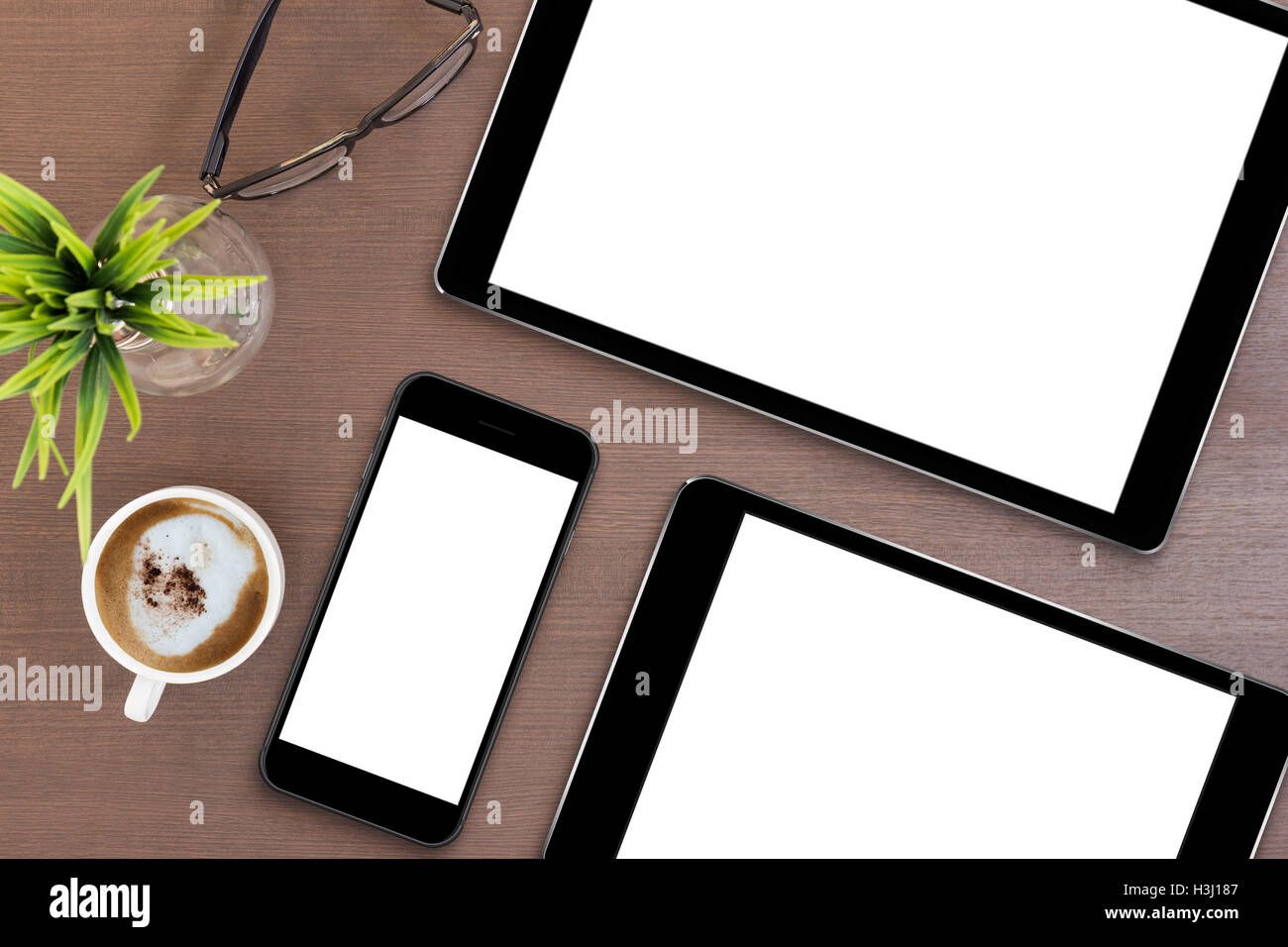 phone and tablet blank screen on table top view, mock up smart phone ...