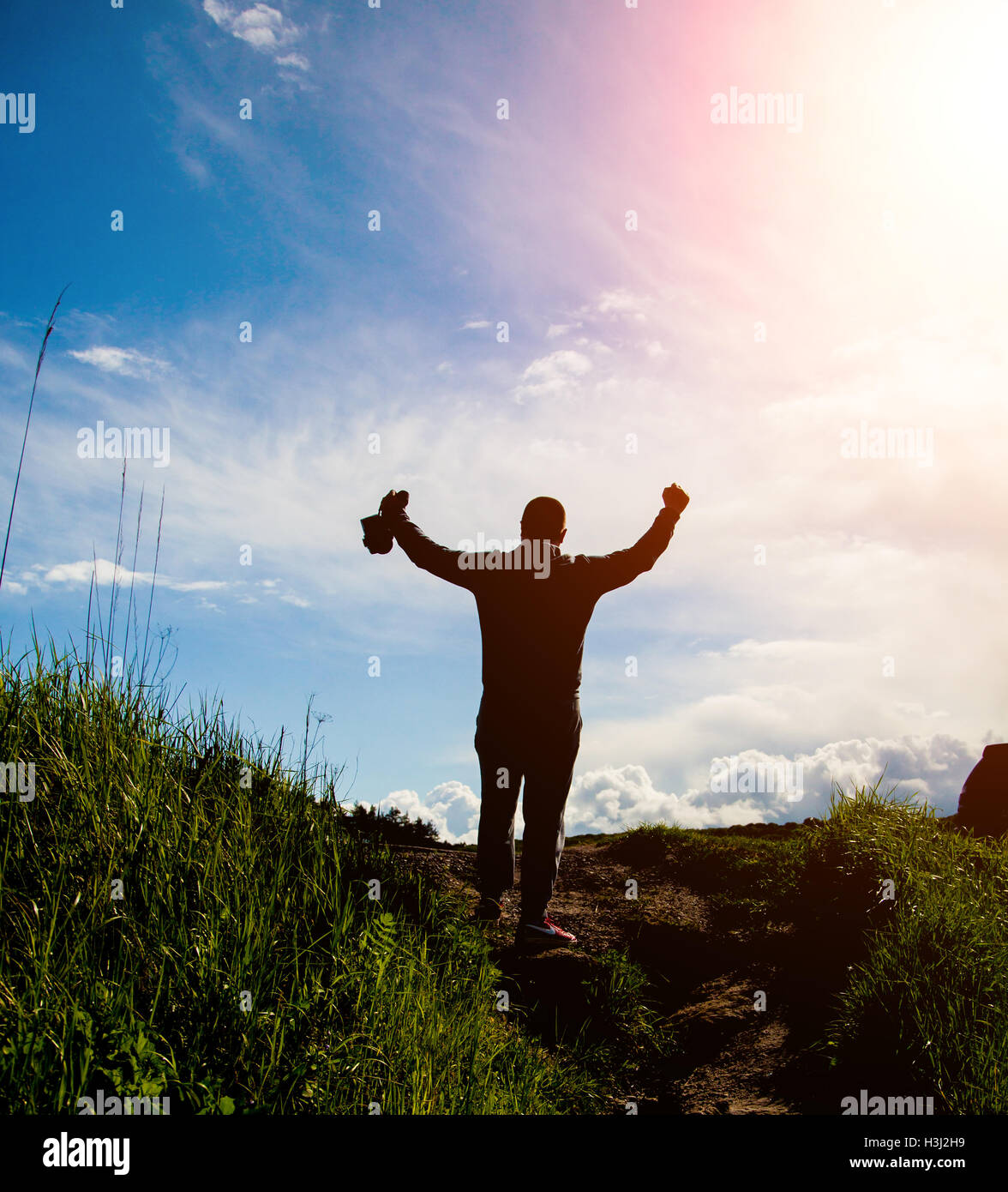 Hands holding up action hi-res stock photography and images - Alamy