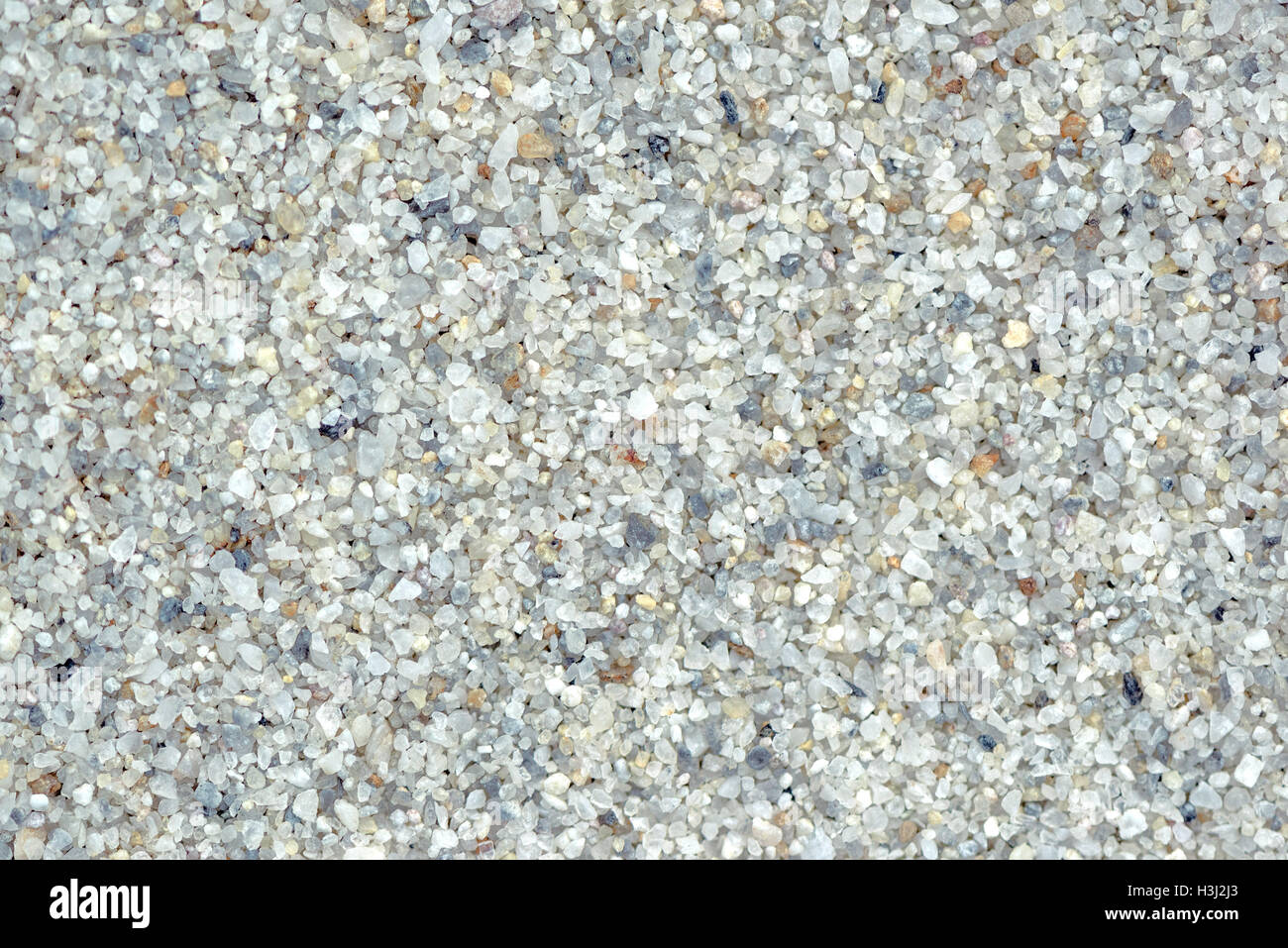 Quartz sand abstract texture as background, macro view of grainy ...