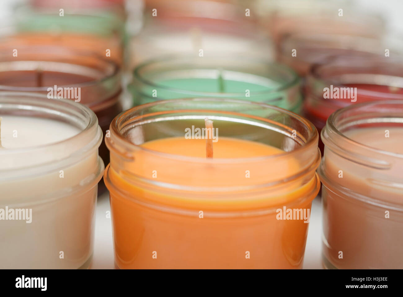 rows of colorful candles Stock Photo - Alamy
