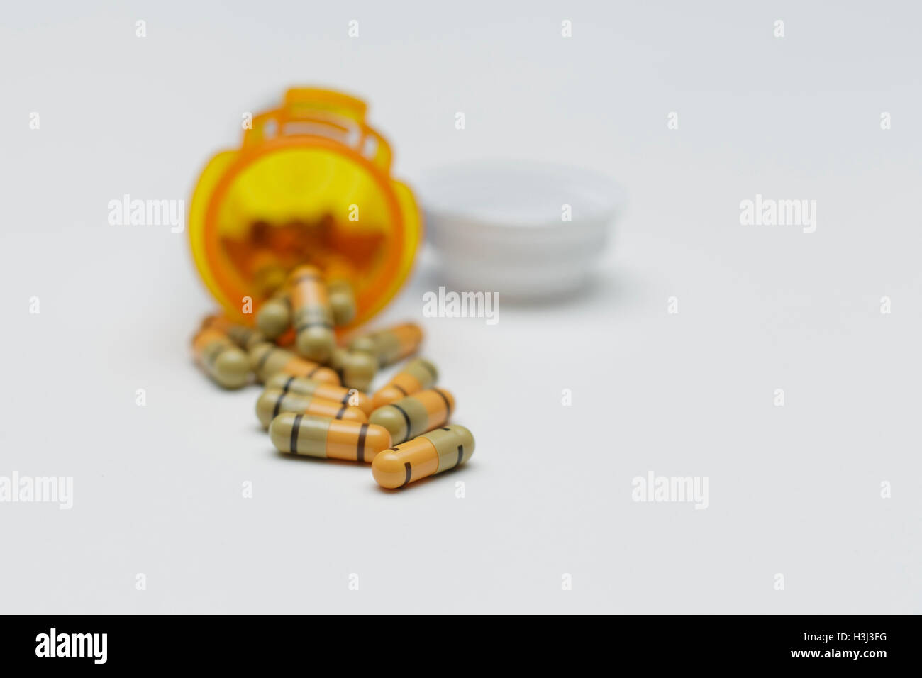 Pills falling out prescription bottle hi-res stock photography and ...
