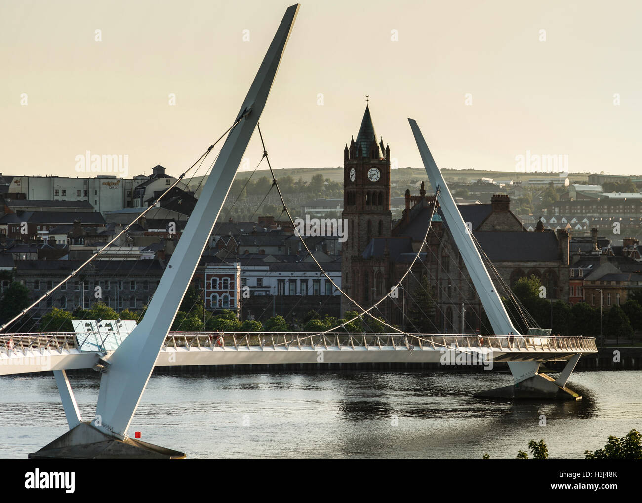 Derry/Londonderry The Guildhall framed by the piers of The Peace Bridge ...