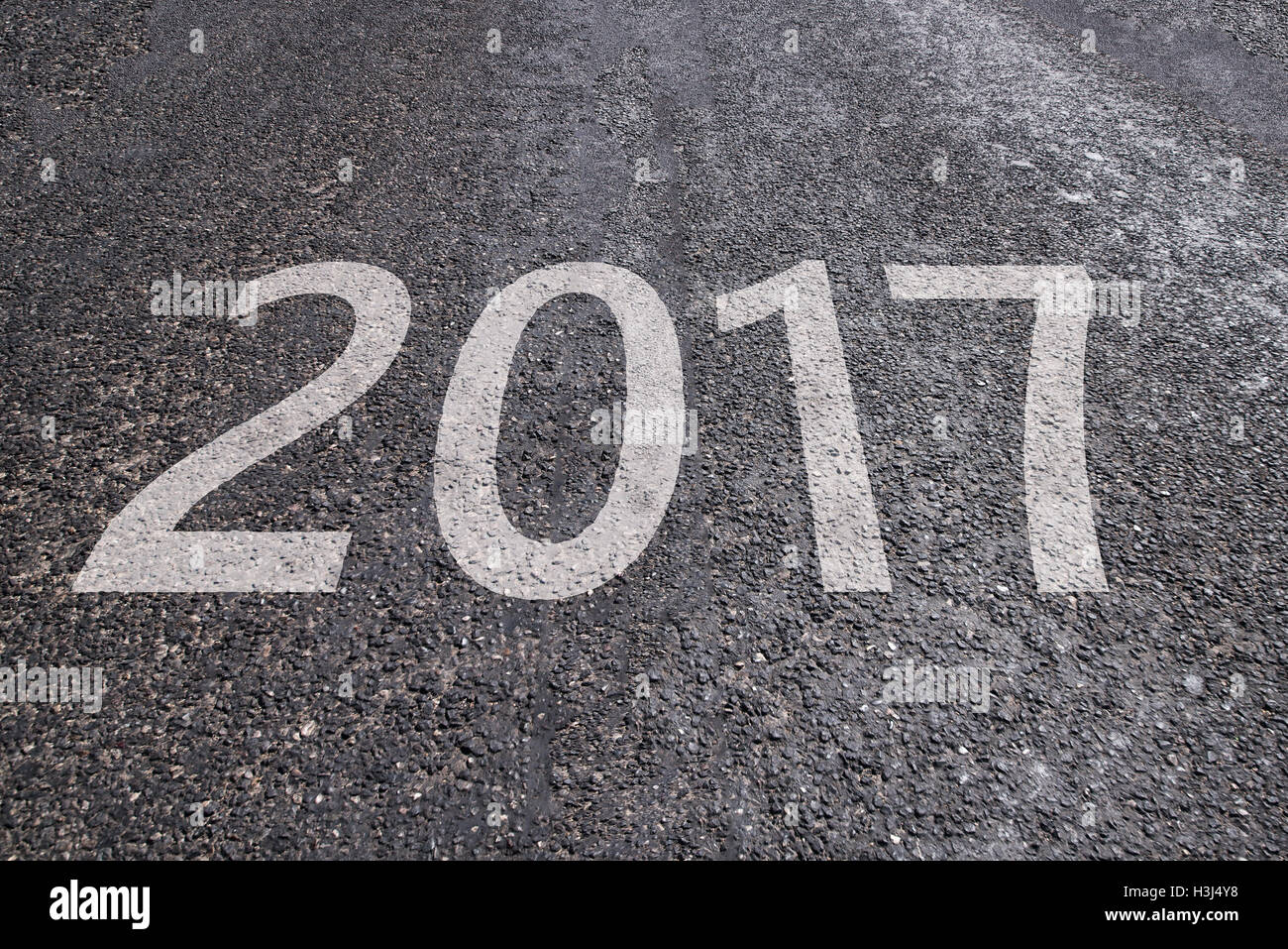 2017 text on asphalt road, new year concept Stock Photo - Alamy