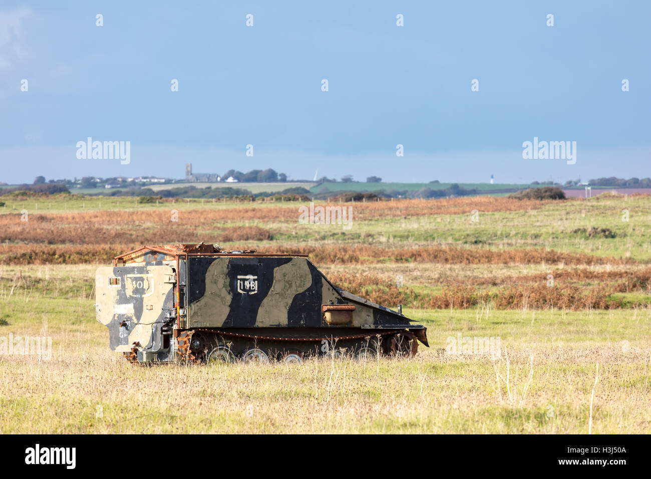 Old armored vehicle used for target practice on the Castlemartin Range ...