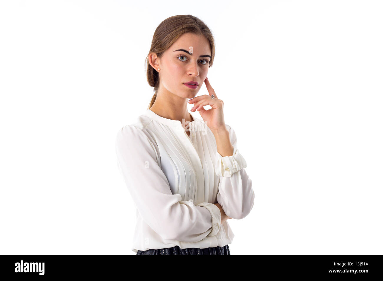 Woman holding hand near the face Stock Photo - Alamy