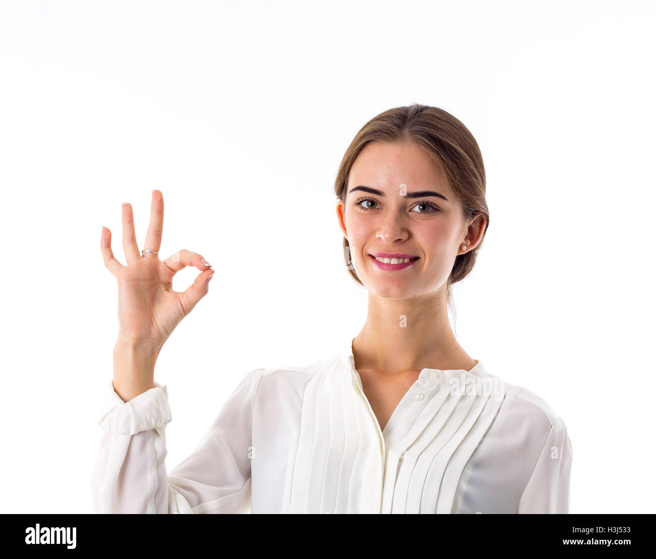 Woman showing okay Stock Photo - Alamy