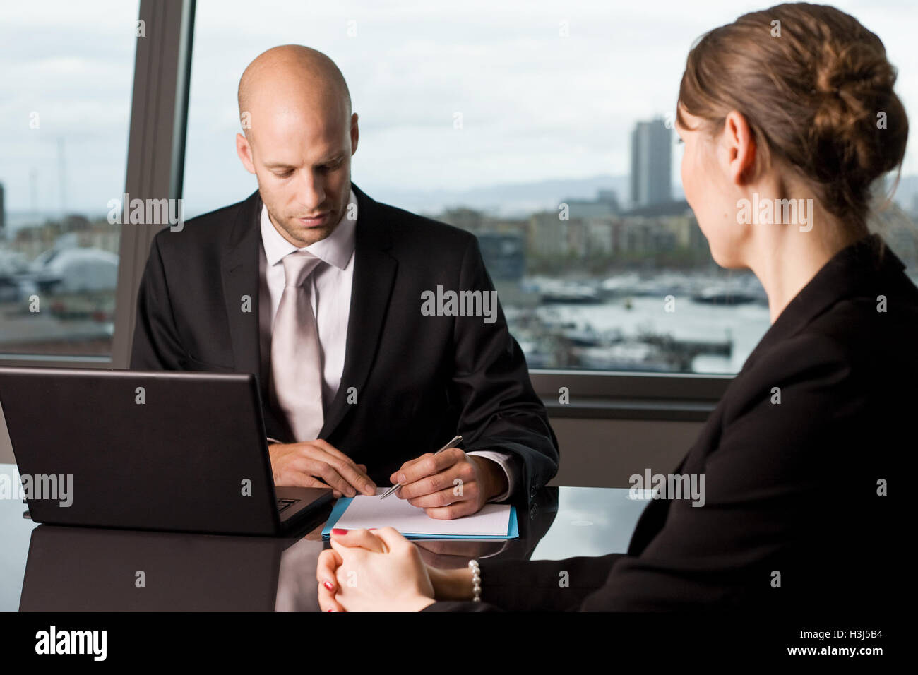 Human resources agent recruiting a new employee Stock Photo - Alamy