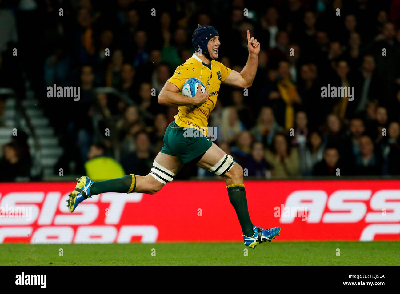 Australia's Dean Mumm runs in to score thier fourth try during the ...