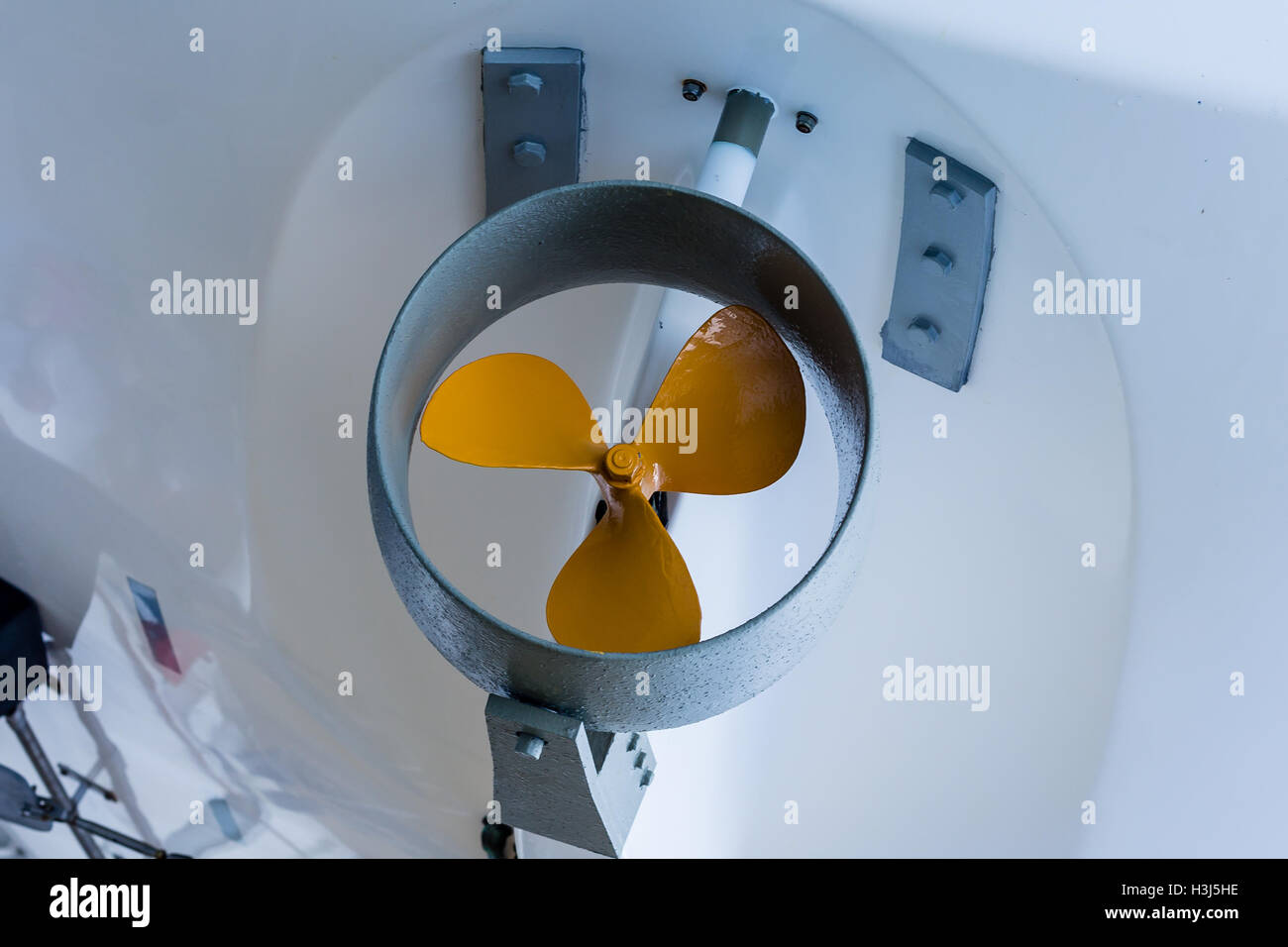 Yellow propeller on white hull of a lifeboat Stock Photo - Alamy