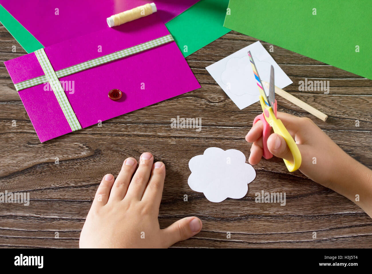 Greeting card handmade birthday. The child cut out paper details ...