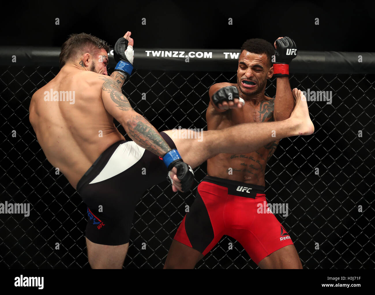 Mike Perry (left) in action against Danny Roberts during their ...