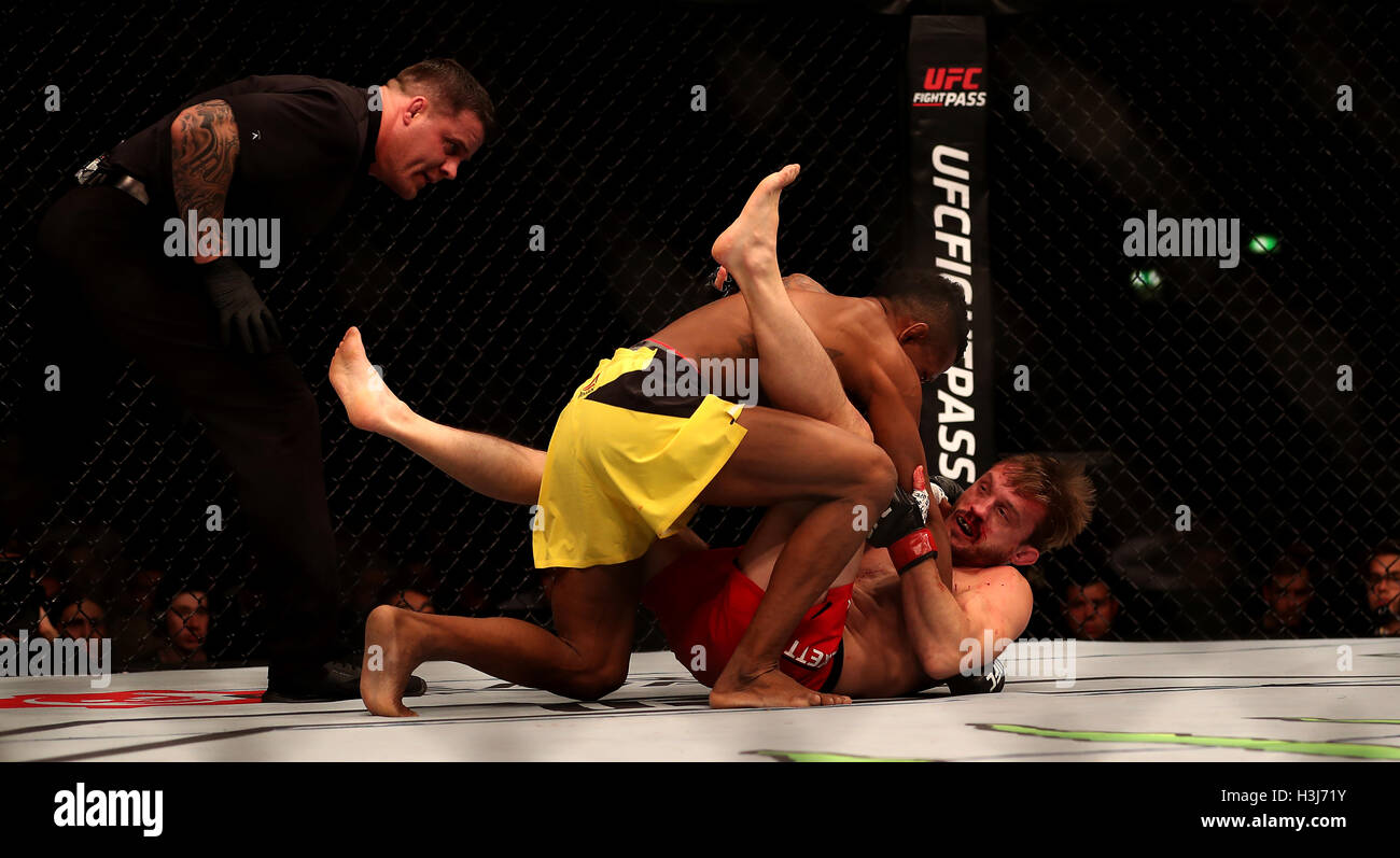 Brad Pickett (right) in action against Iuri Alcantara fights during ...