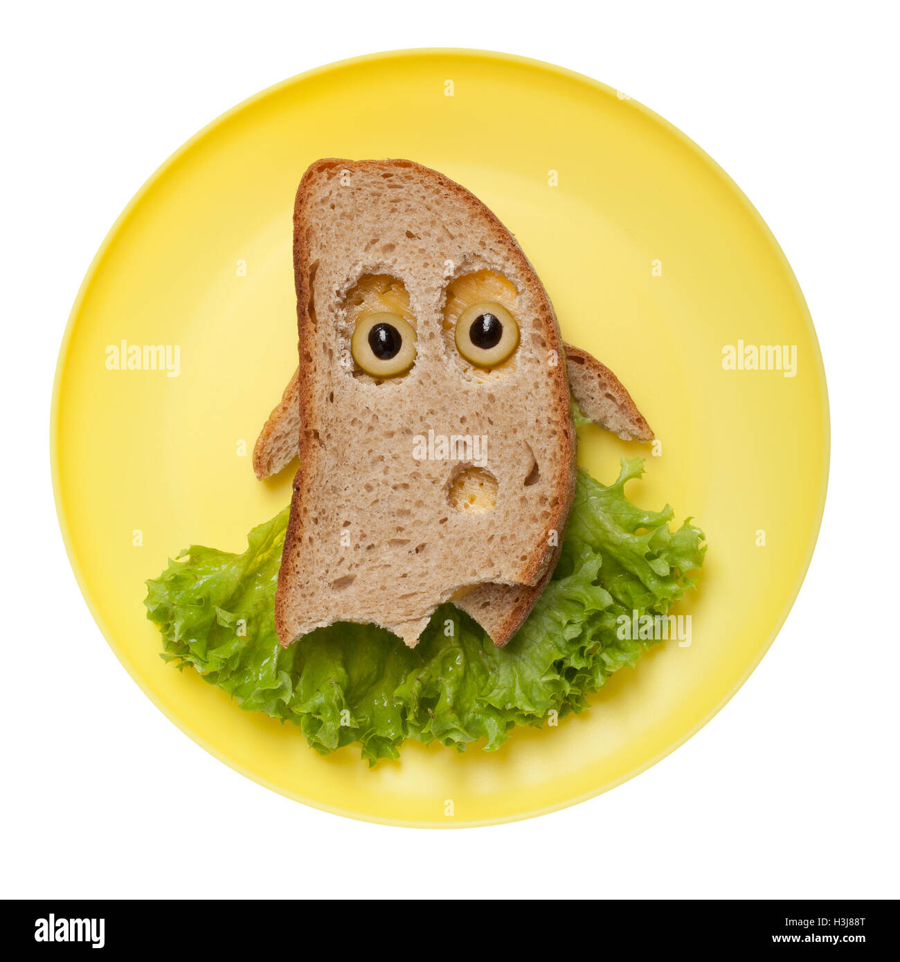 Halloween ghost made of bread and salad on plate Stock Photo - Alamy