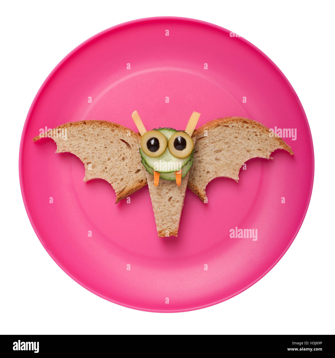 Halloween bat made of bread on plate Stock Photo - Alamy