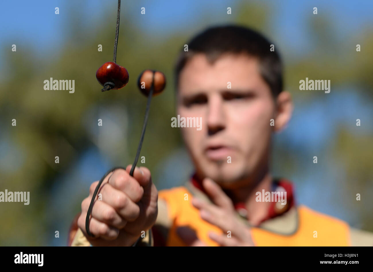 A competitor takes a shot during the 51st World Conker Championships at ...