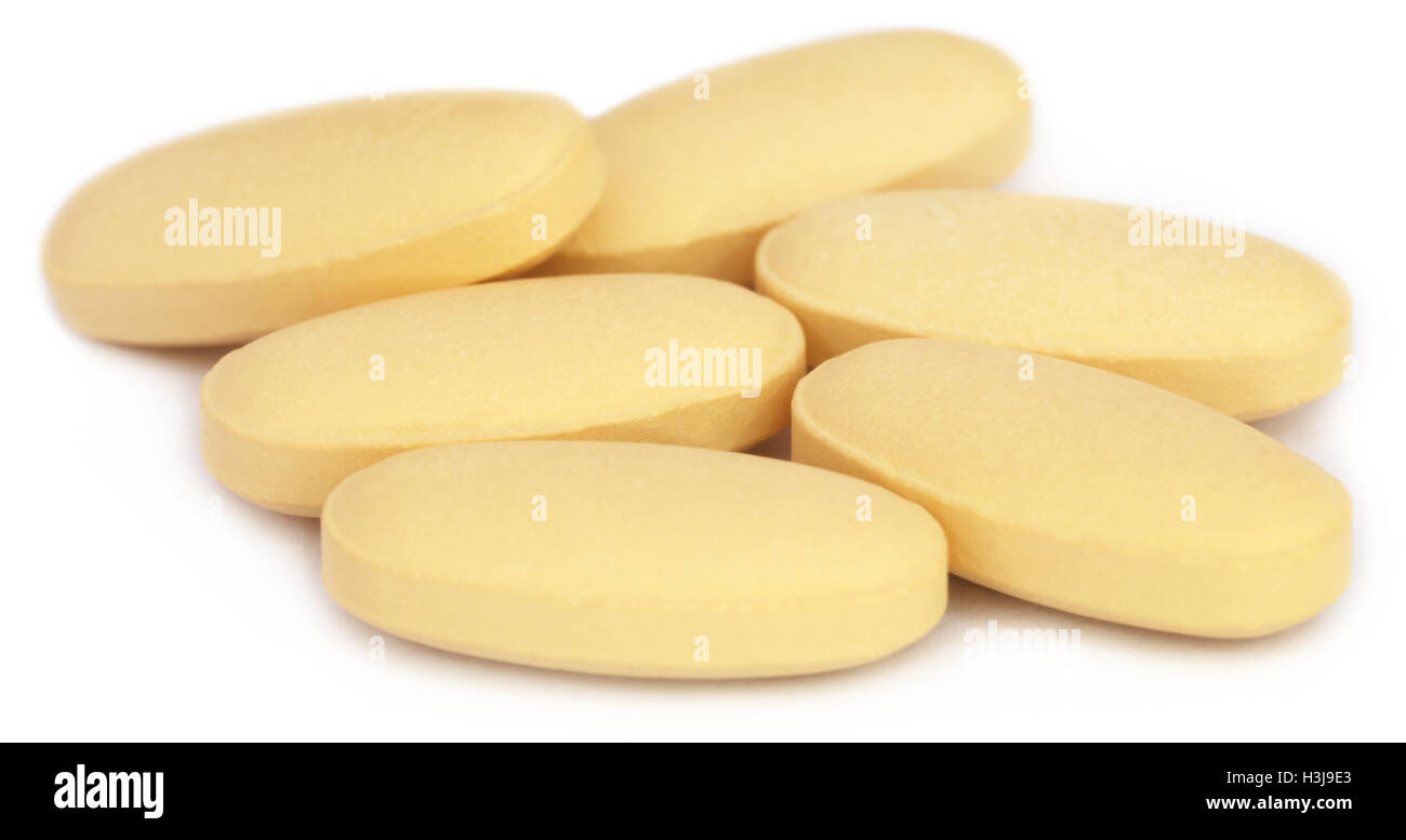Tablets over white background Stock Photo - Alamy