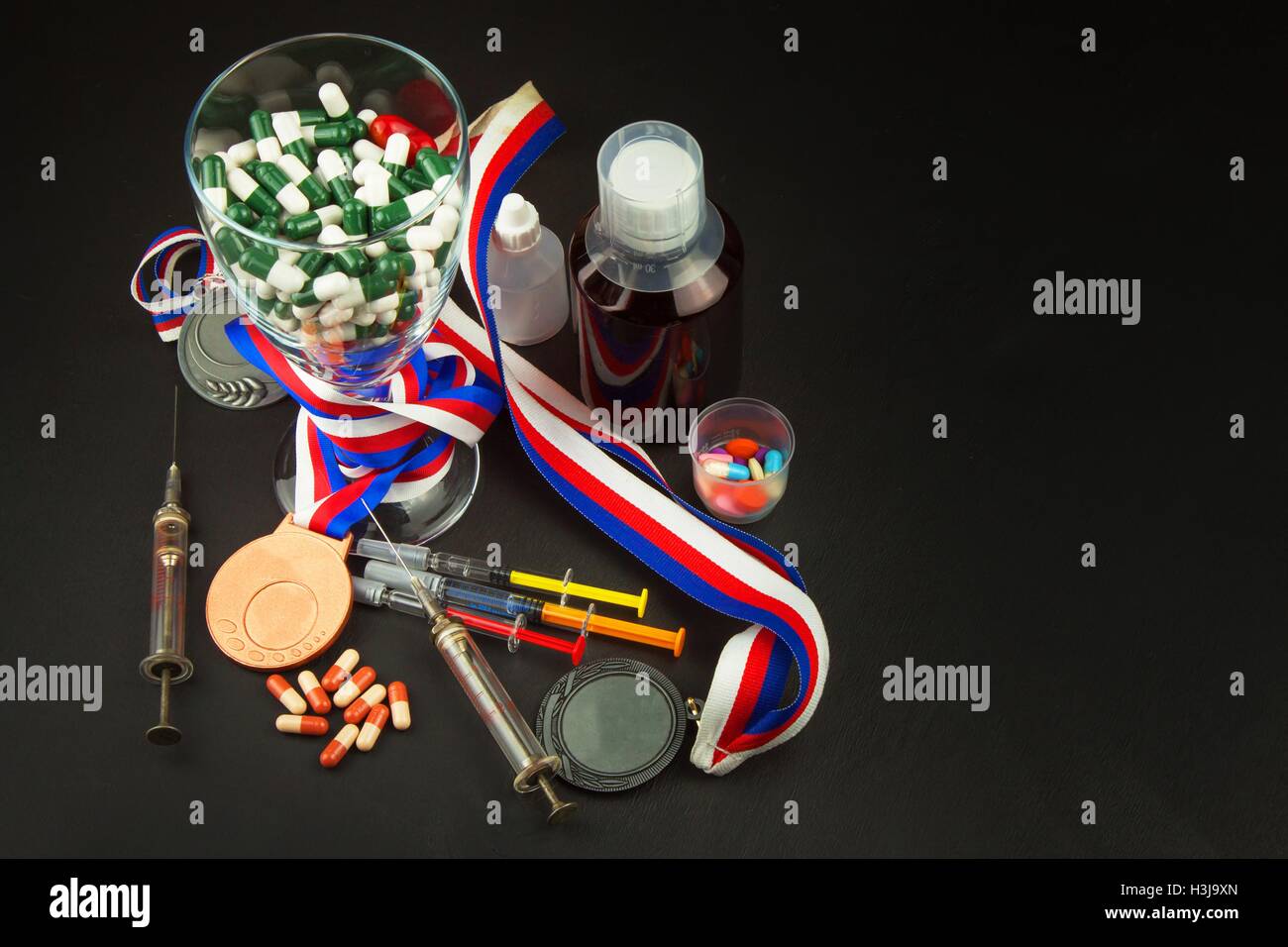 Doping in sport. Abuse of anabolic steroids for sports. Anabolic ...