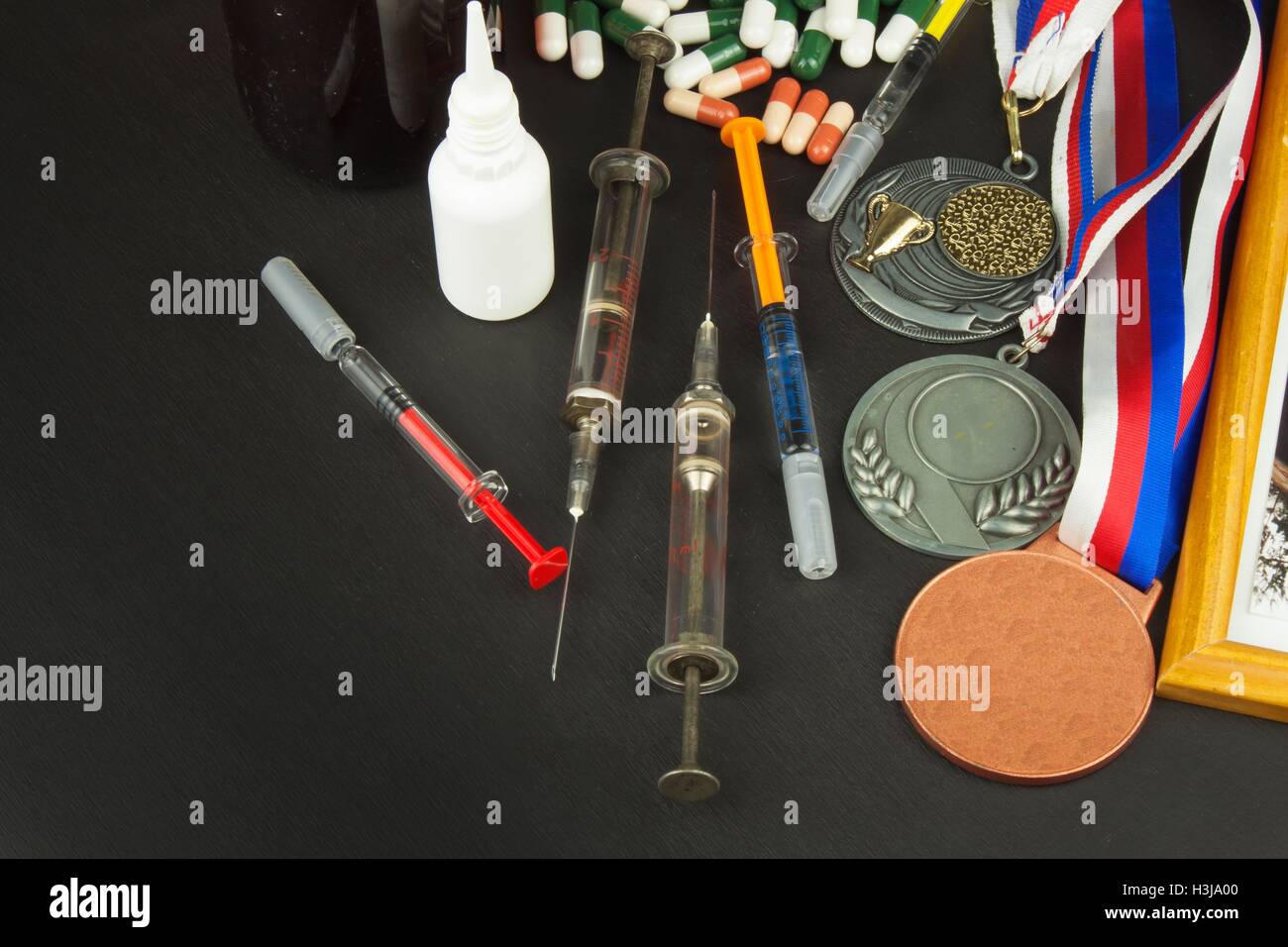 Doping in sport. Abuse of anabolic steroids for sports. Anabolic ...