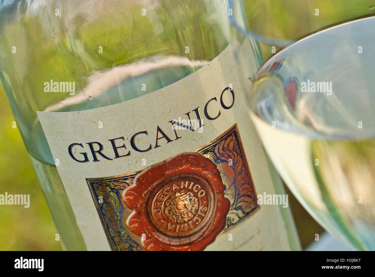 Close view on bottle and glass of Grecanico/Garganega a variety of ...