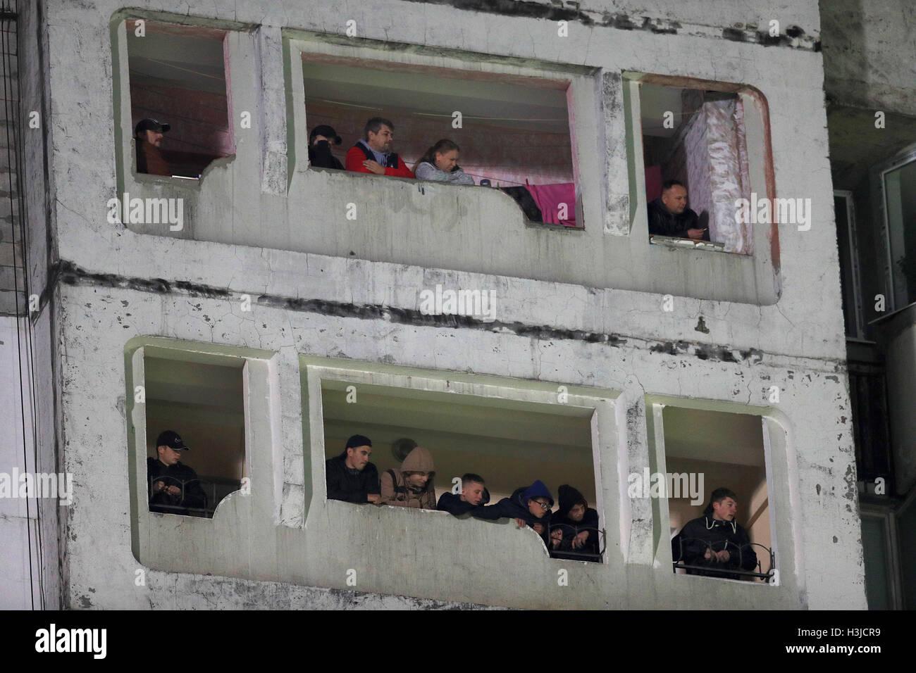 People match the match from a neighbouring tower block during 2018 FIFA ...