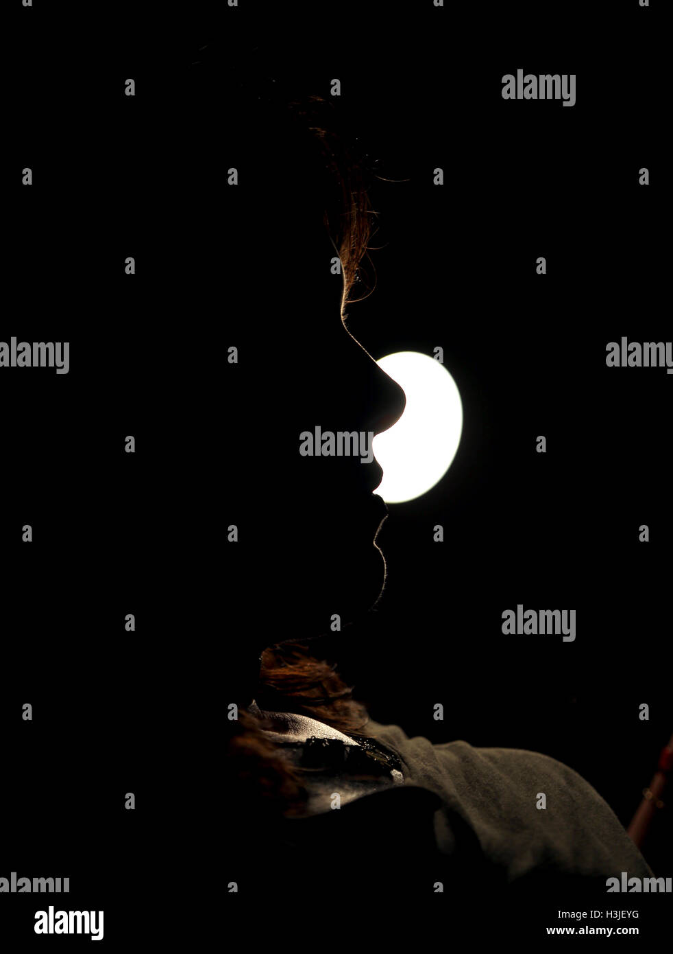 backlight of a profile with the mouth and nose of a young woman Stock ...