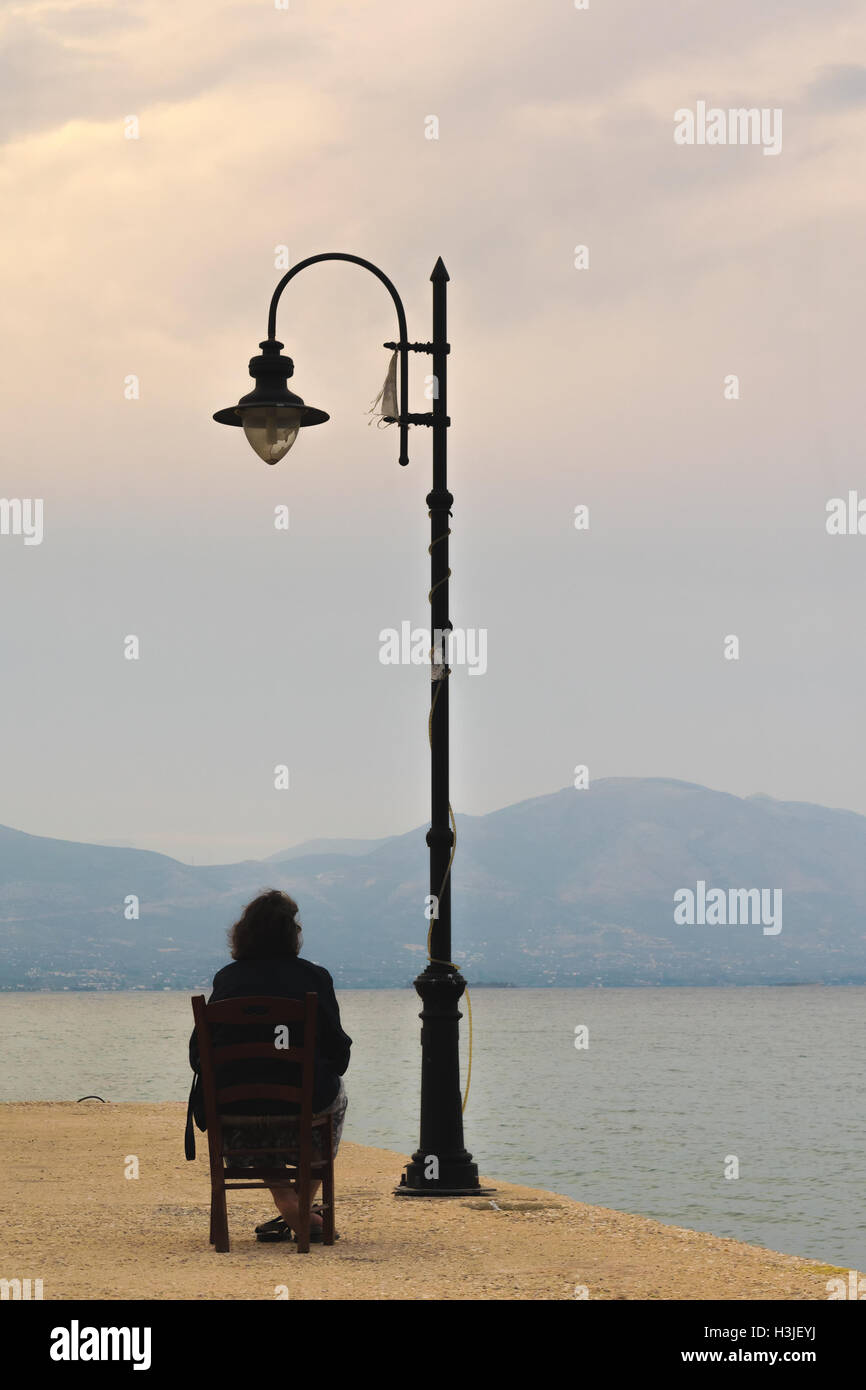 Old lady at sunset hi-res stock photography and images - Alamy