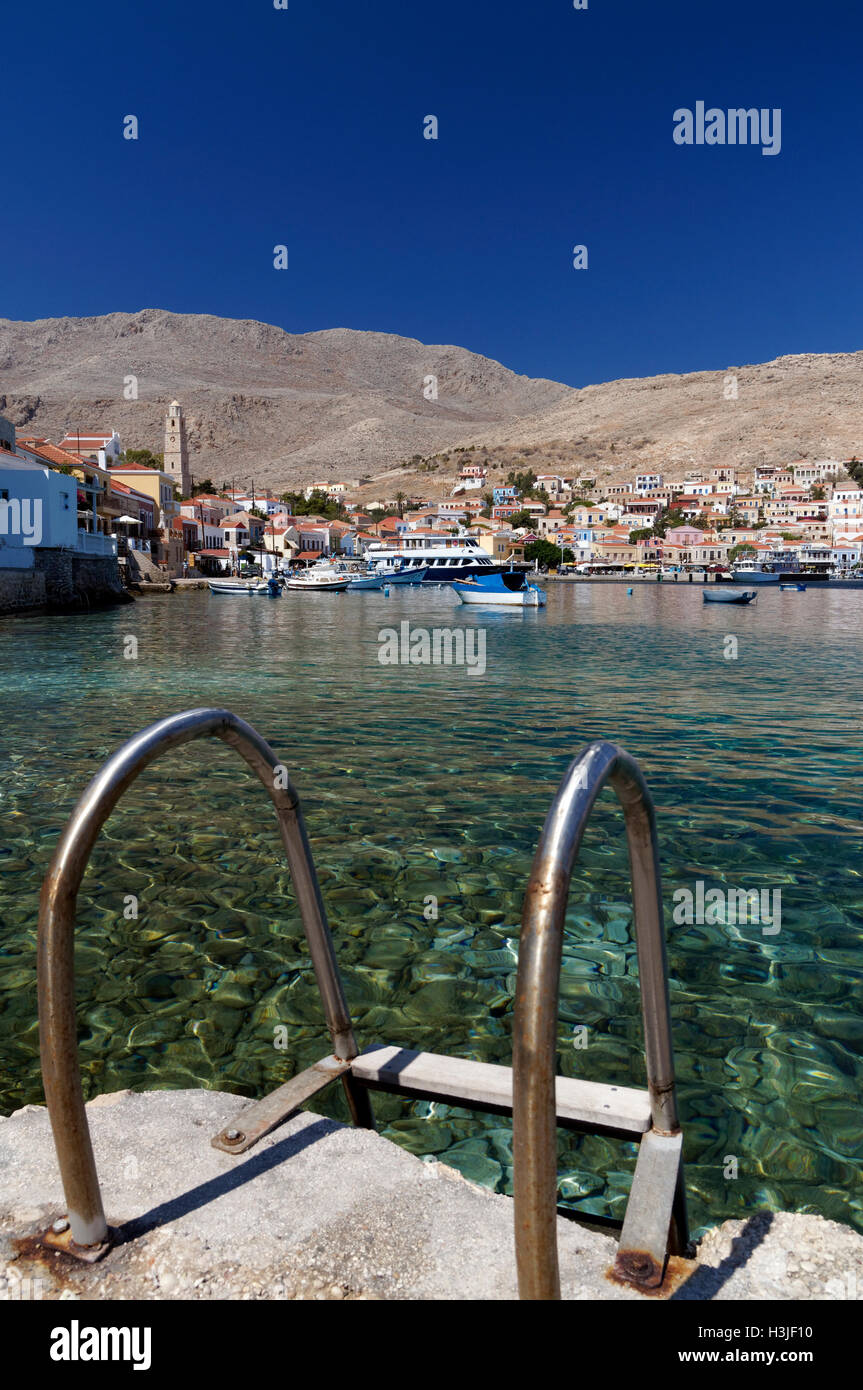 Ladder into harbour, Village of Emborio, Chalki Island near Rhodes ...