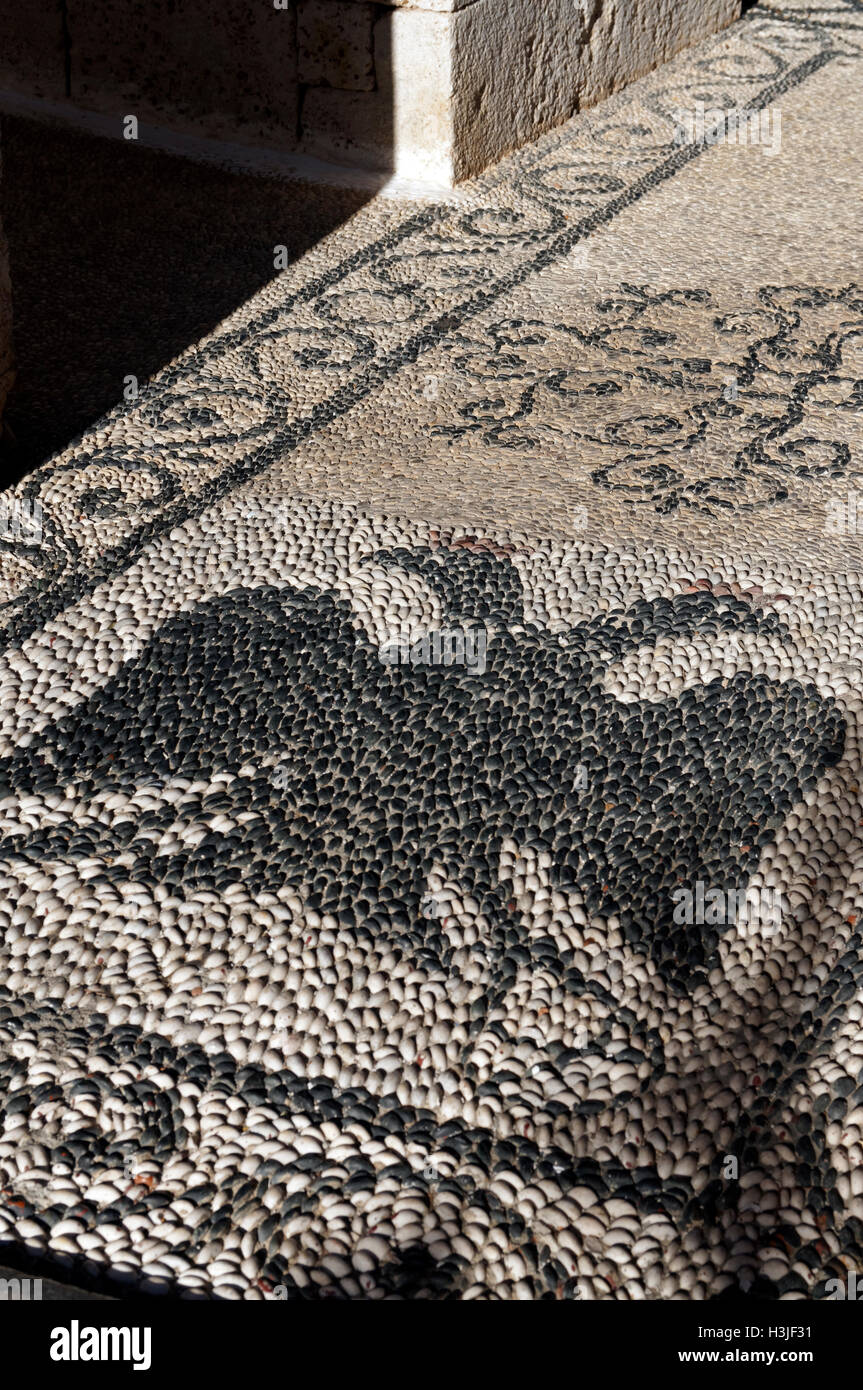 Design made from different coloured pebbles, Agios Nikolaos church ...