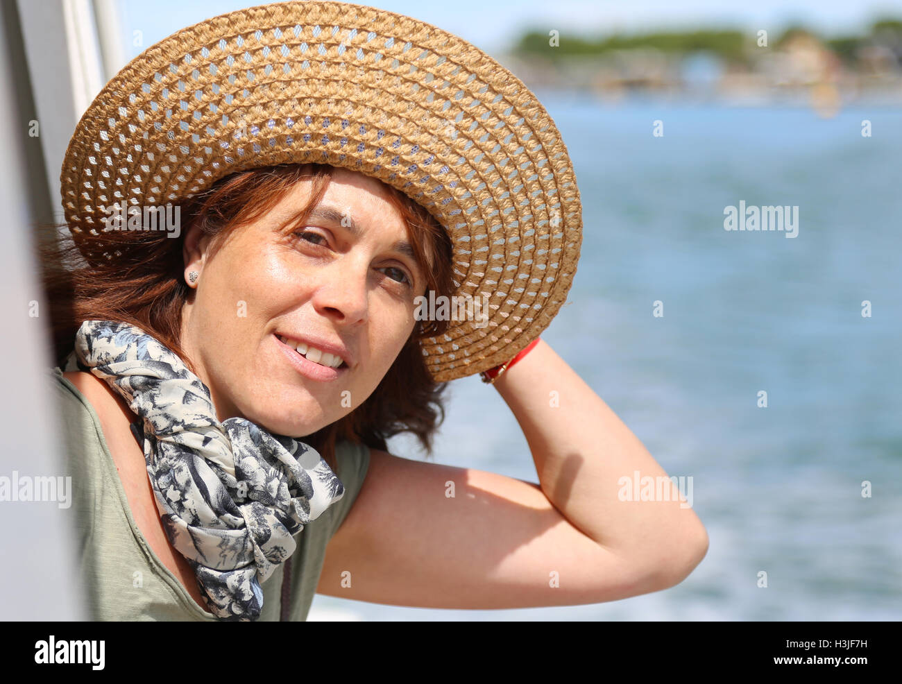 beautiful real lady forty years old without makeup with straw hat on ...
