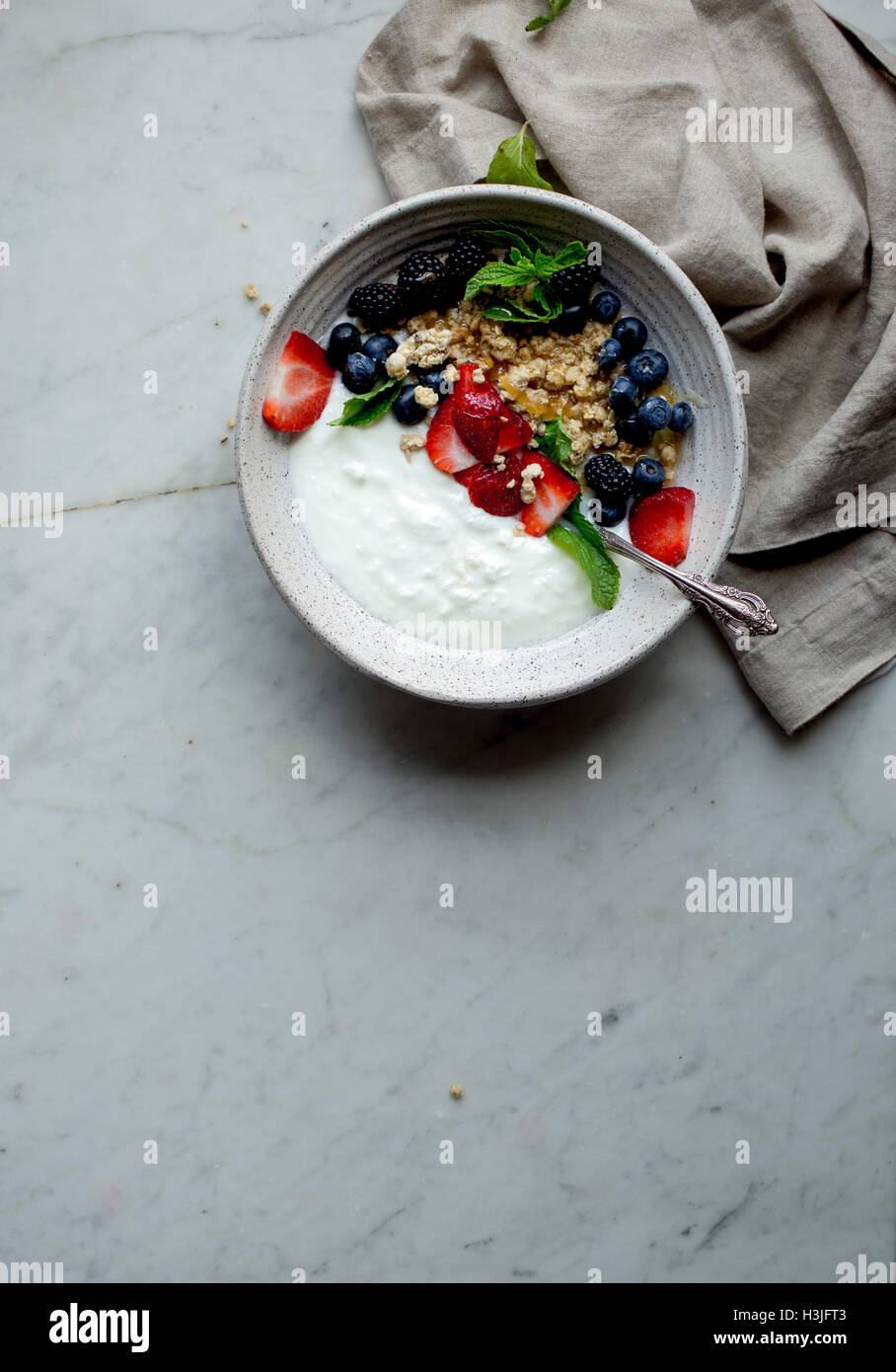 Yogurt in bowls with fresh fruit Stock Photo - Alamy