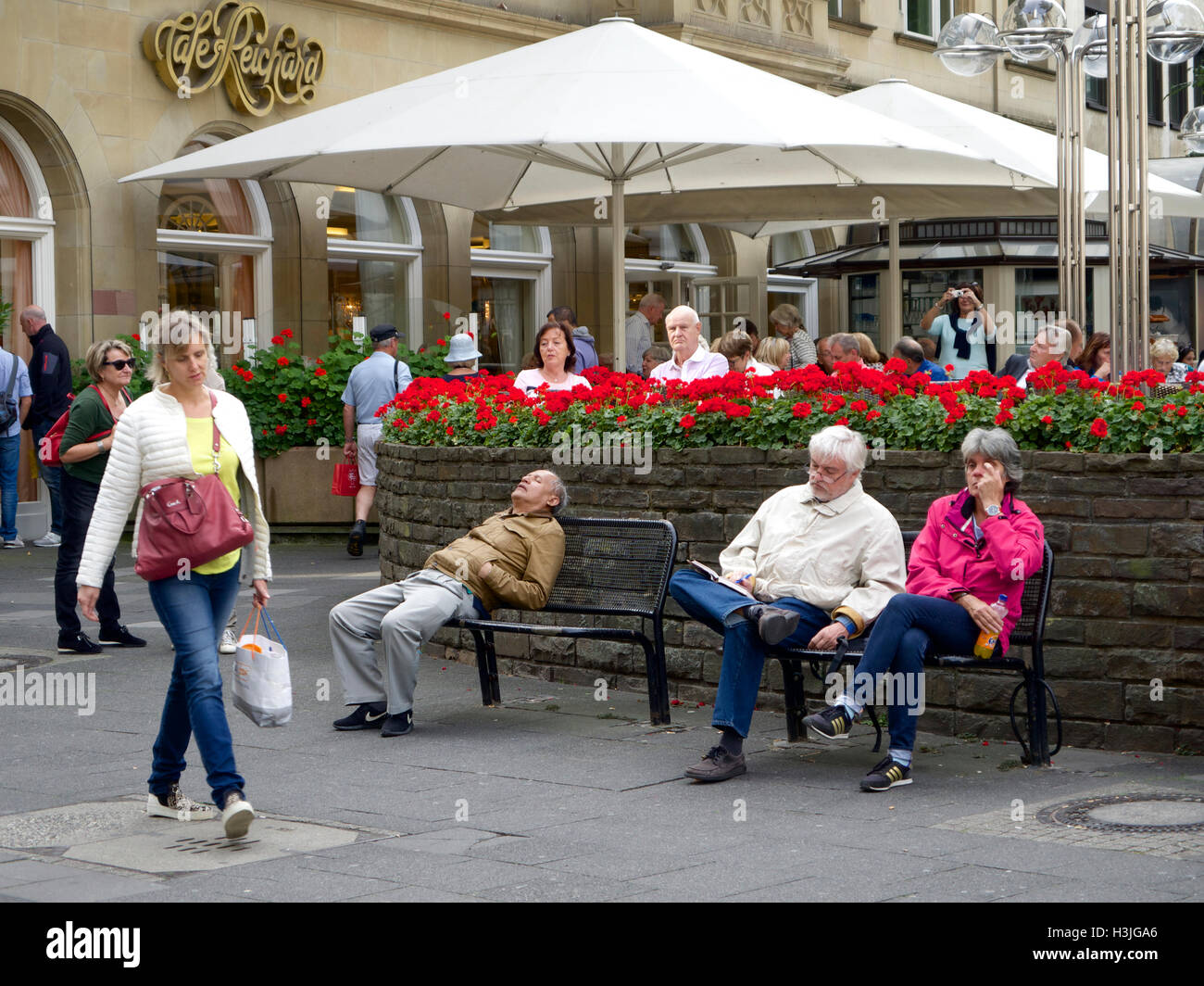 Collection of average people in Cologne, Germany, including sleeping ...