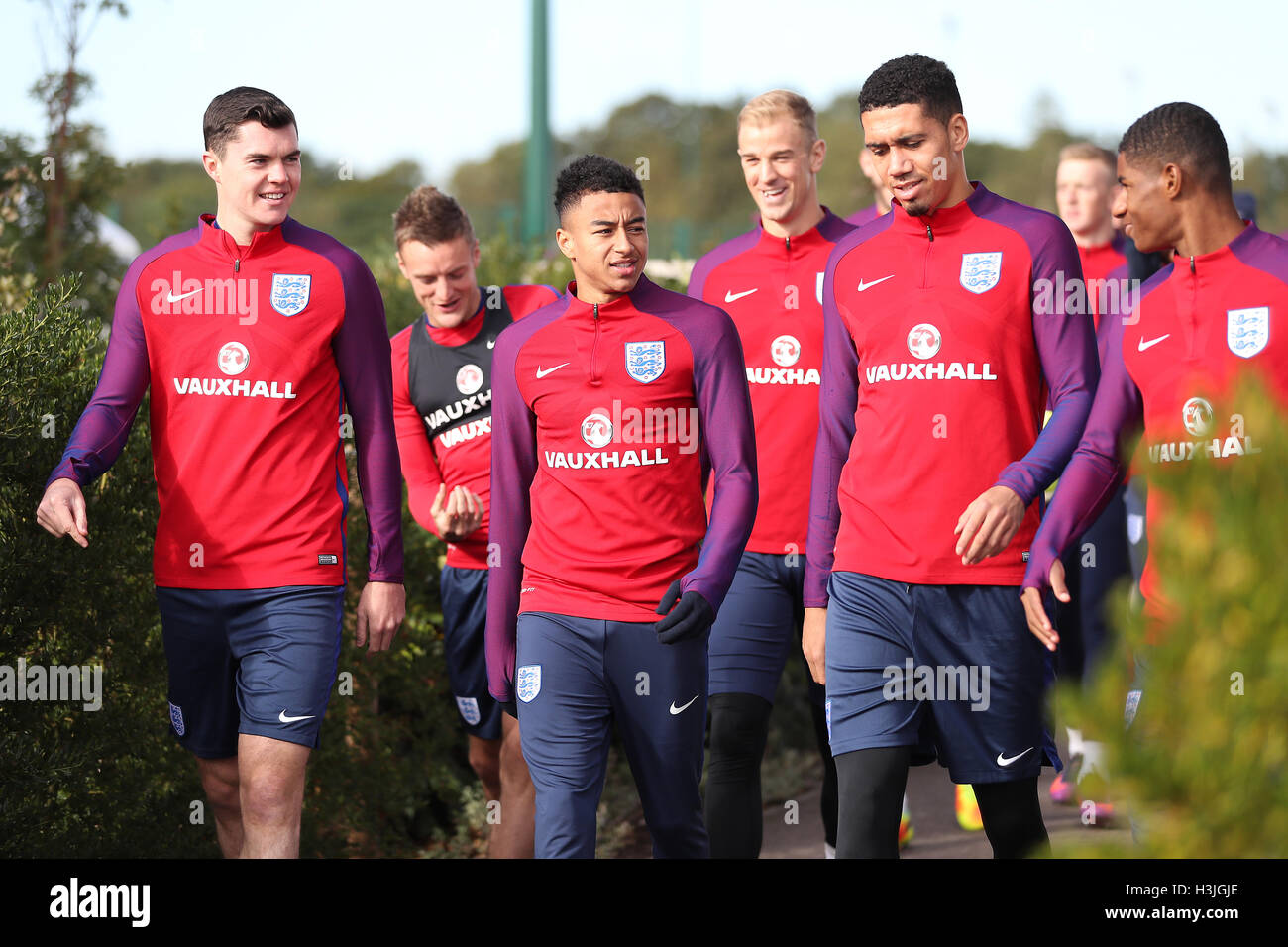 England's Michael Keane (L - R) England's Jesse Lingard, England's ...