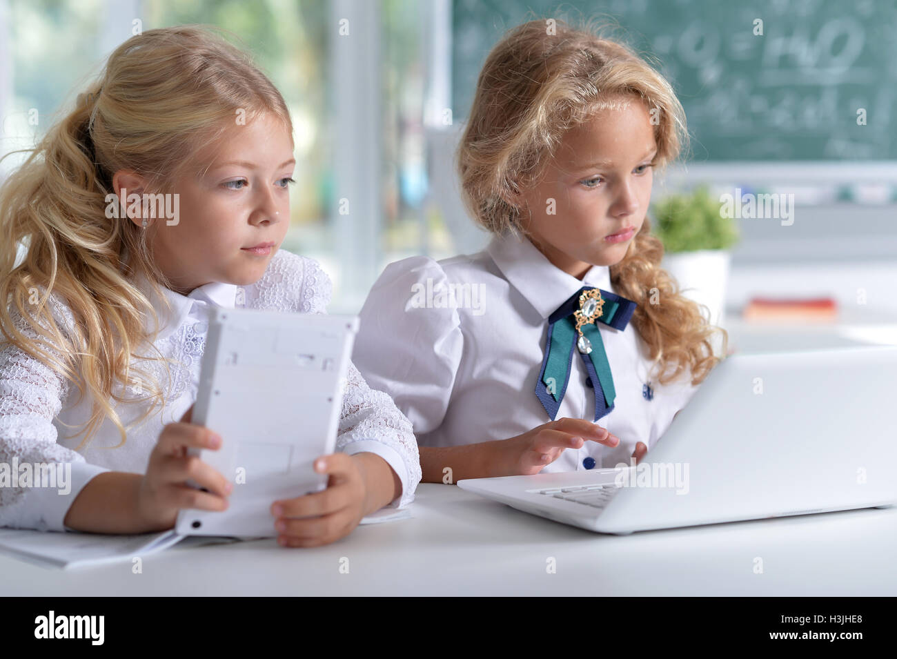 Children laptop tablet class hi-res stock photography and images - Alamy
