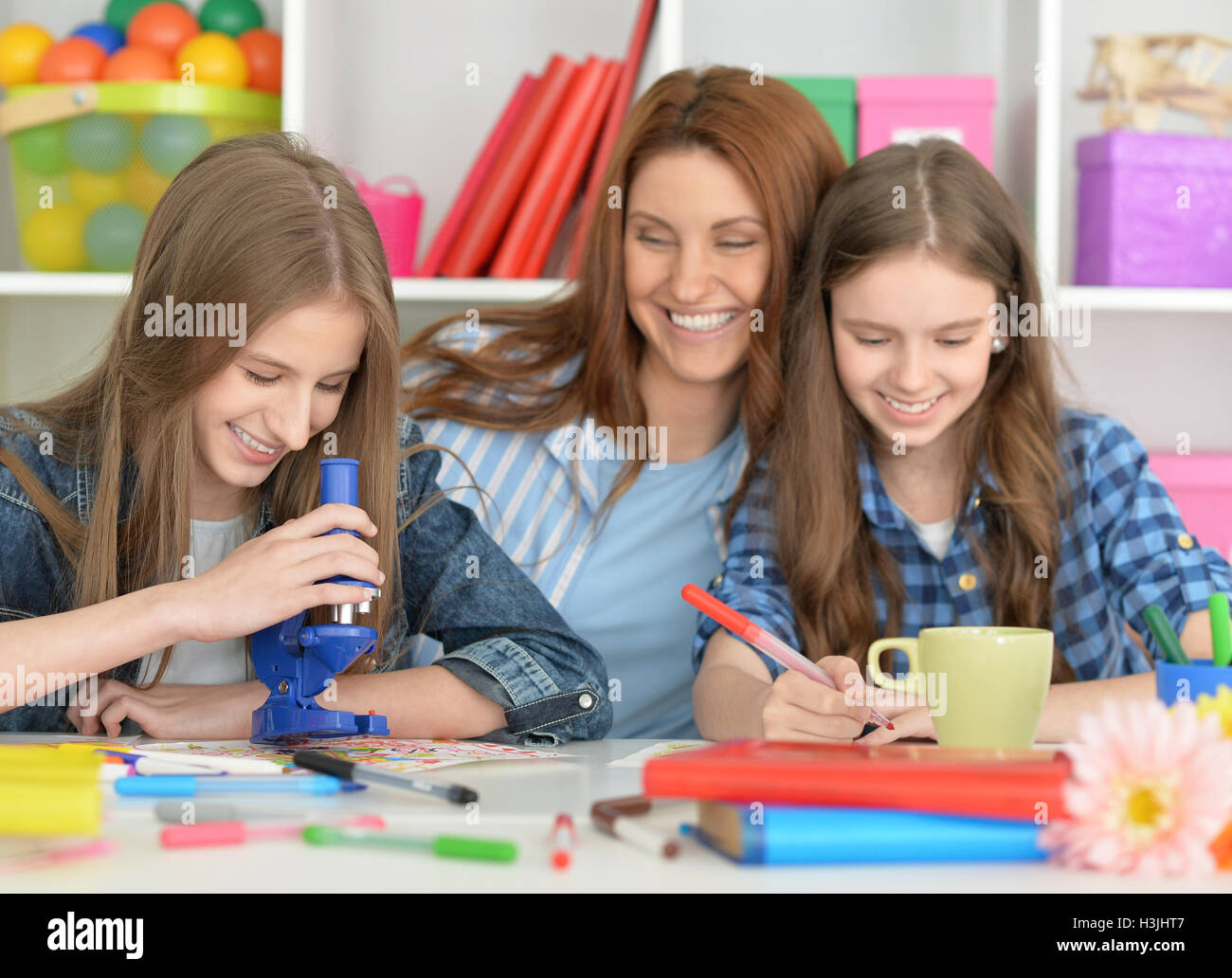 family doing homework together Stock Photo - Alamy