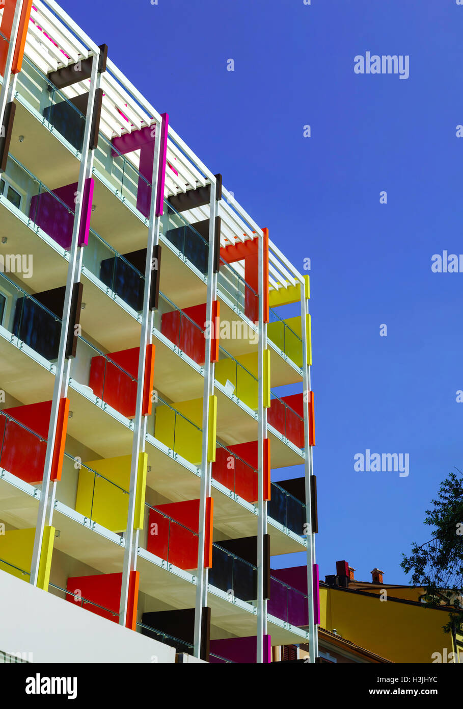 Beautiful colorful fasade of new hotel on sea resort. Touristic concept ...