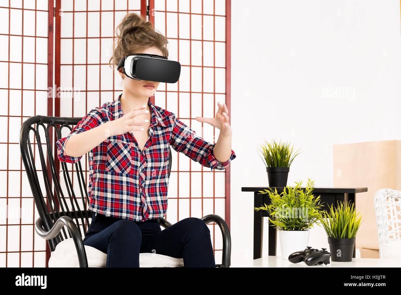 Girl getting experience using VR glasses of virtual reality Stock Photo ...