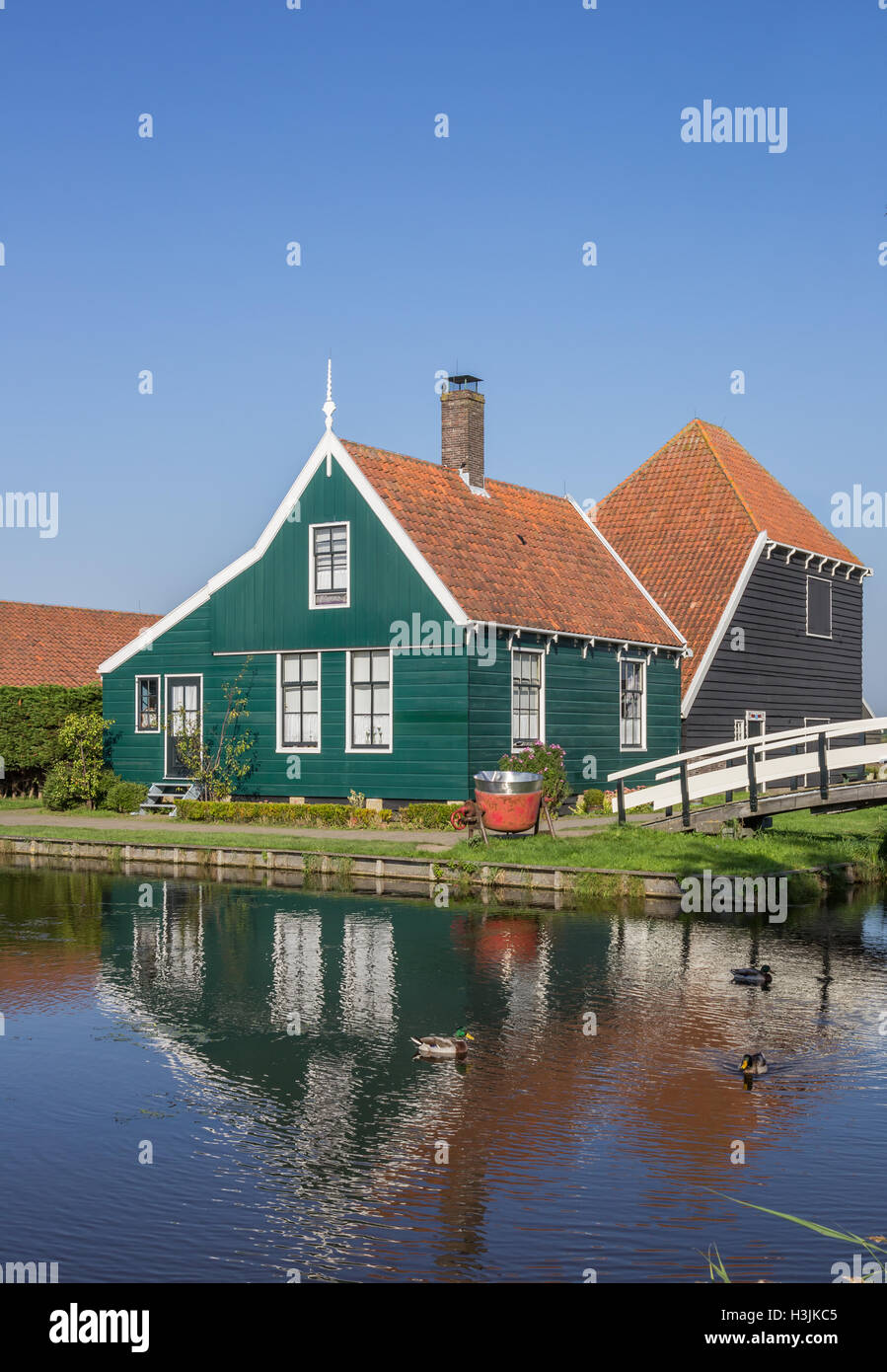 Traditional dutch wooden house and white bridge in Zaanse Schans ...