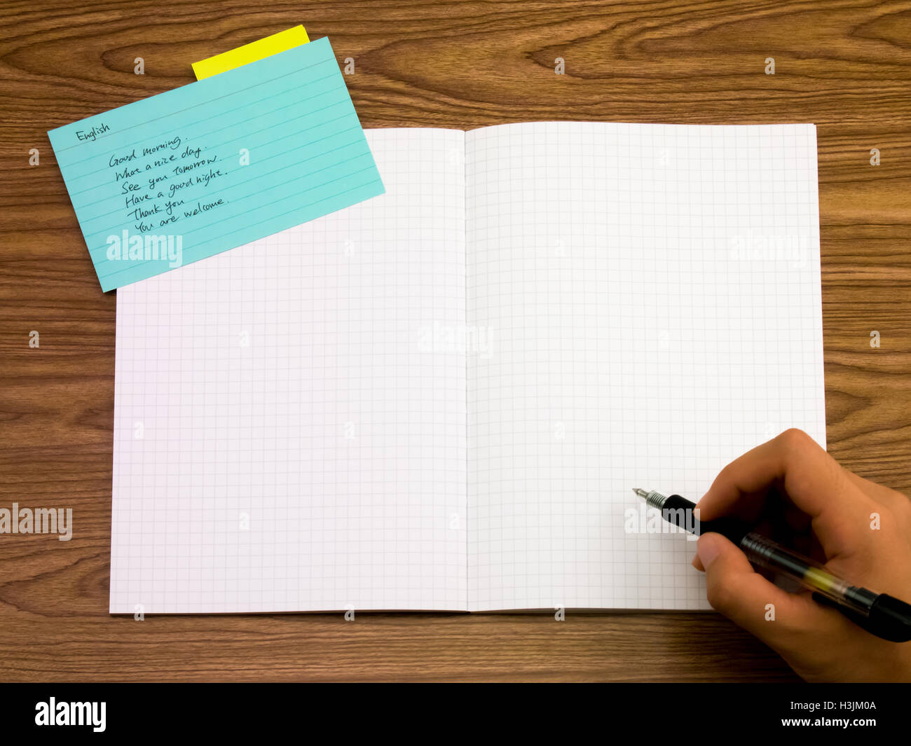 English; Learning New Language Writing Words on the Notebook Stock ...