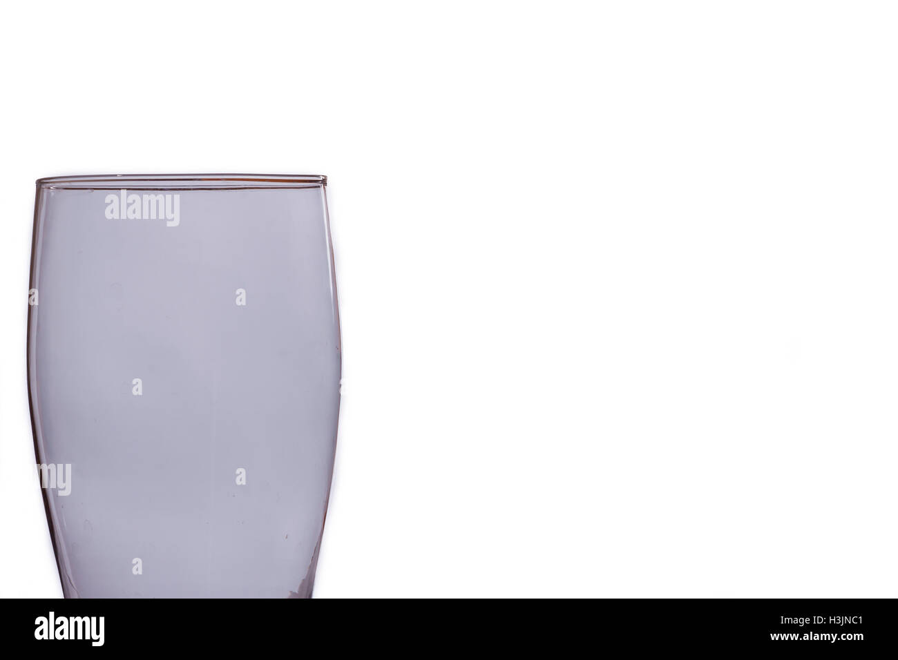 Empty glass on white background Stock Photo - Alamy