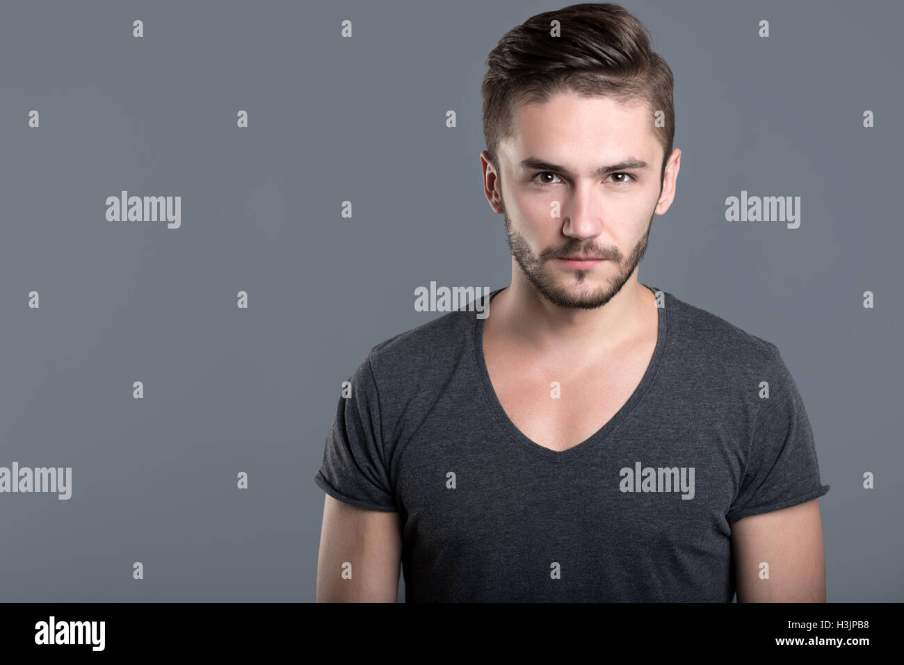 Displeased angry young bearded man hi-res stock photography and images ...
