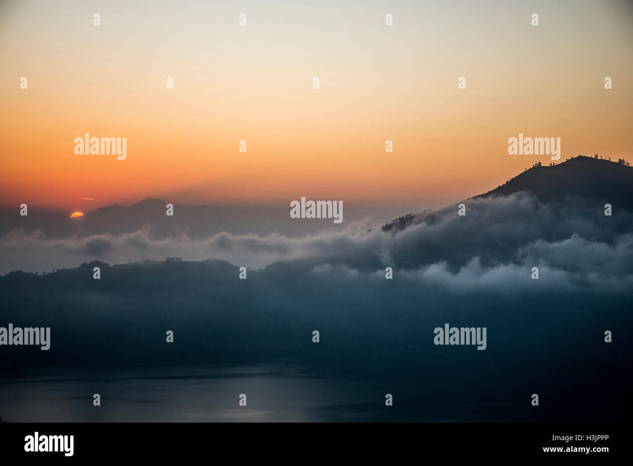 Bali Lake Batur volcano view sunset over Gunung Agung 2 Stock Photo - Alamy