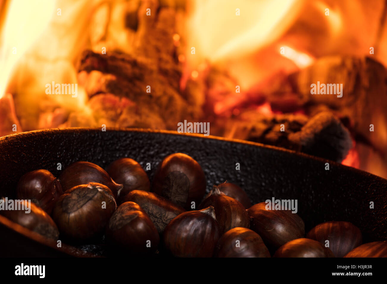 Chestnuts Roasting on a Wood Fire Stock Photo - Alamy